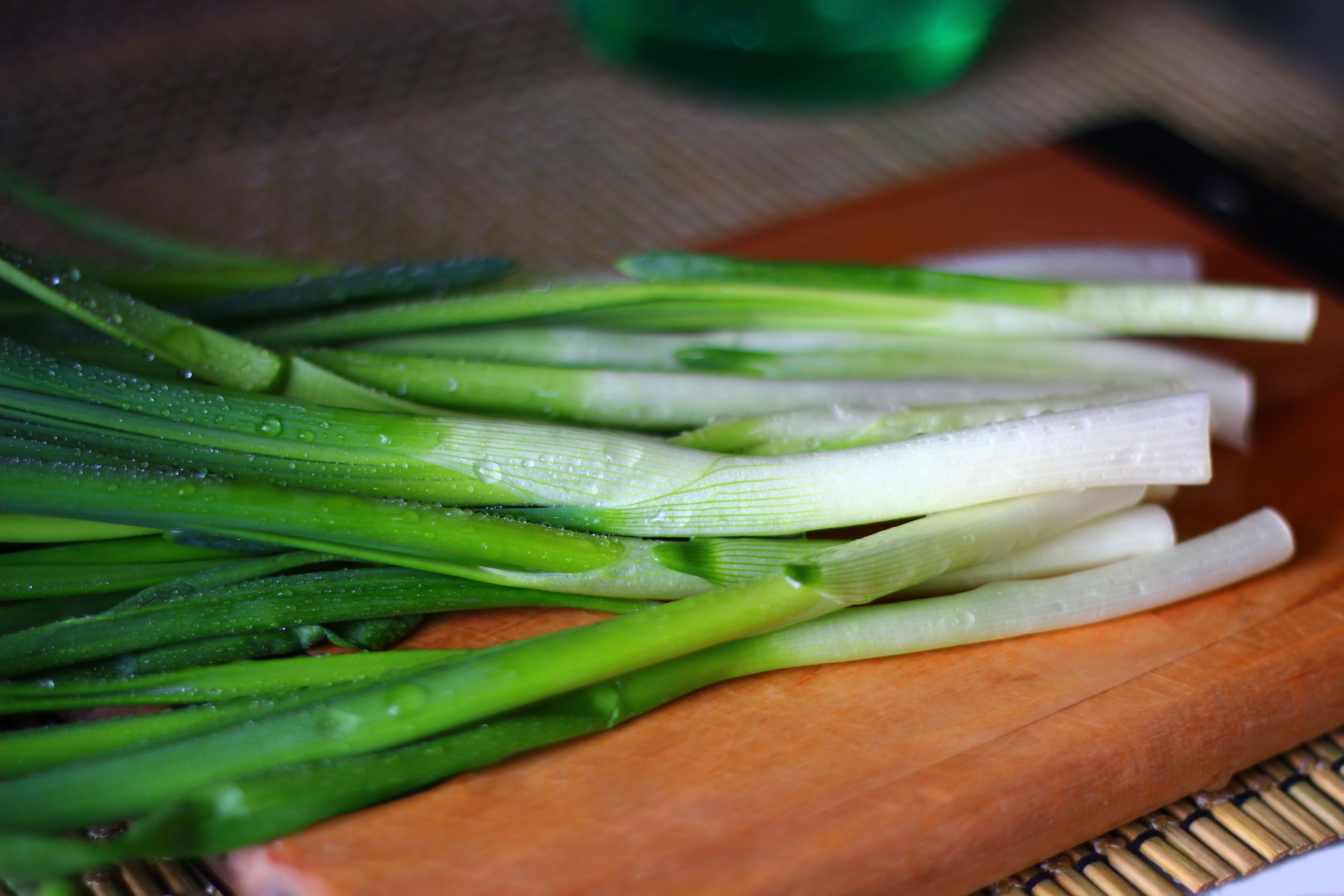 Onions With Green Leaves · Free Stock Photo