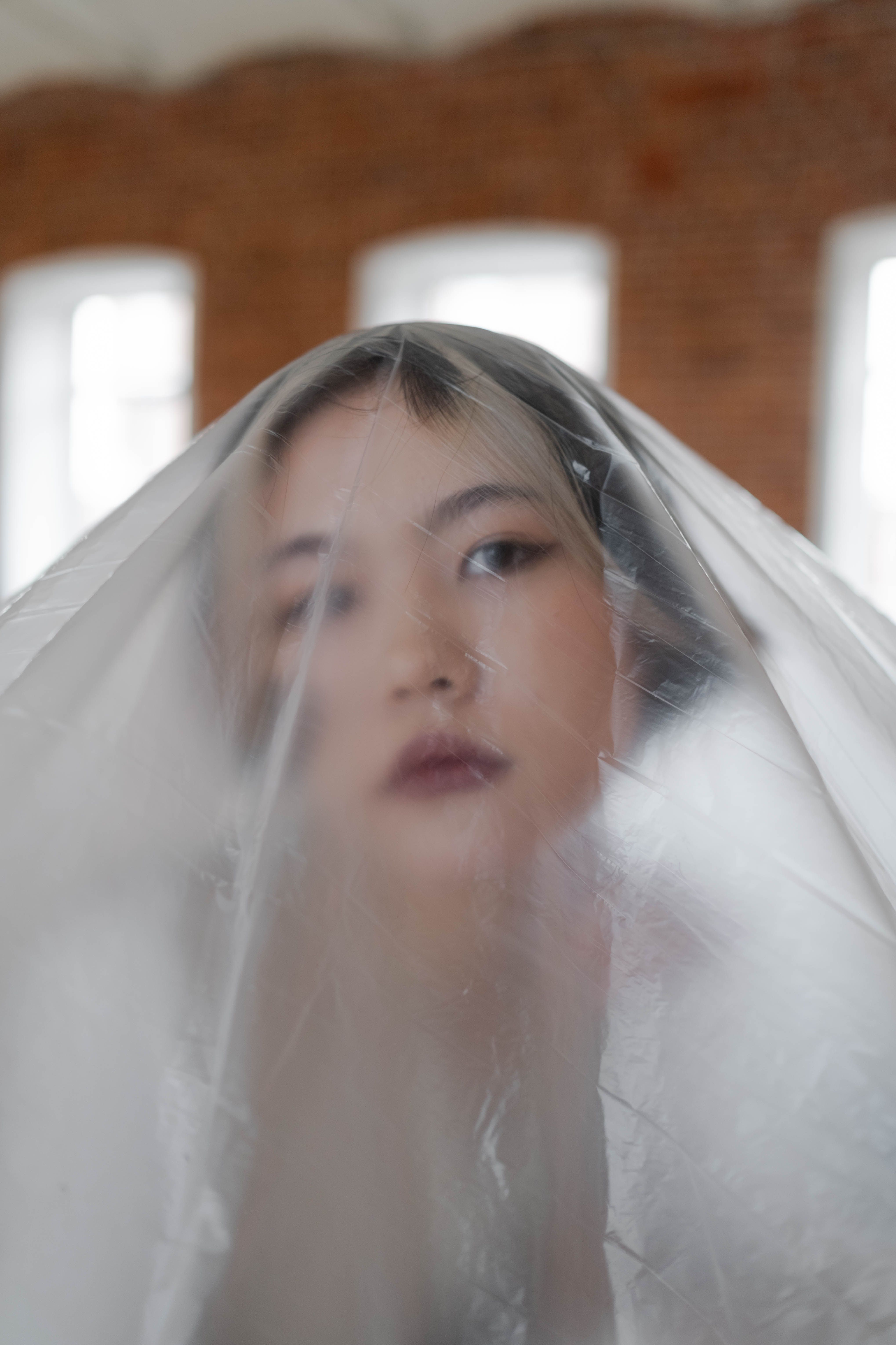 A Person Covered with Plastic · Free Stock Photo