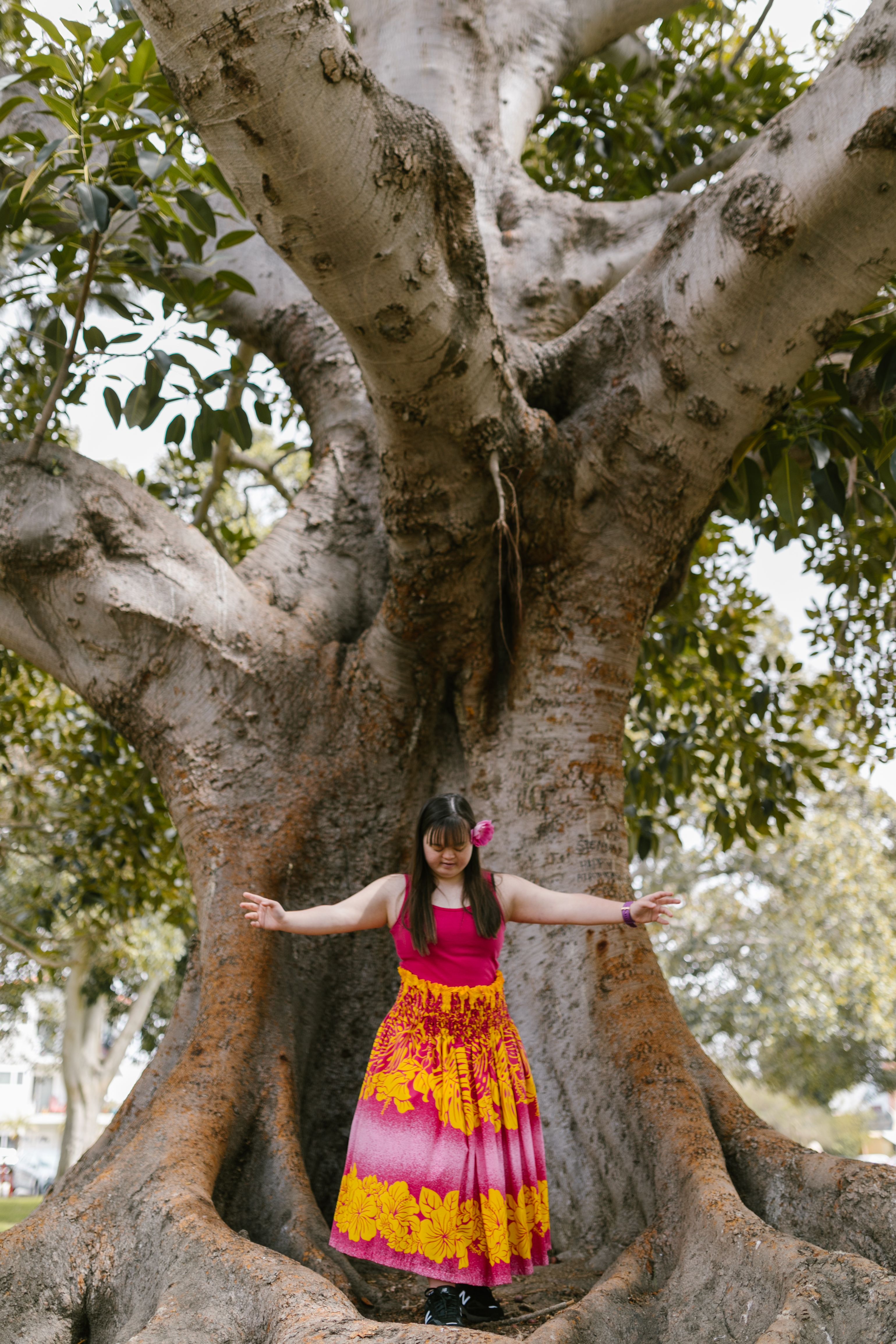 A Girl Posing Under a Tree · Free Stock Photo