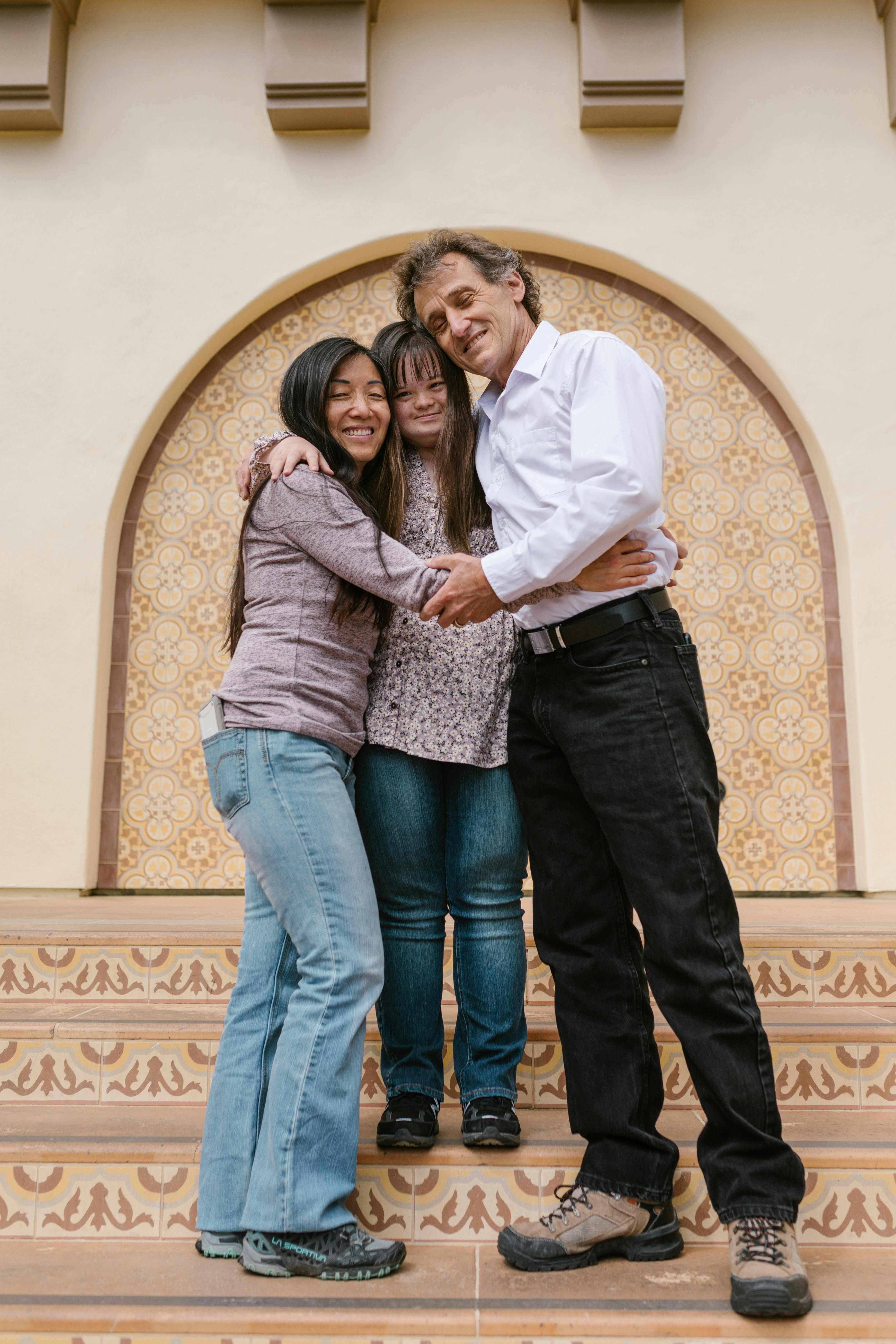 A Family Hugging Each Other · Free Stock Photo
