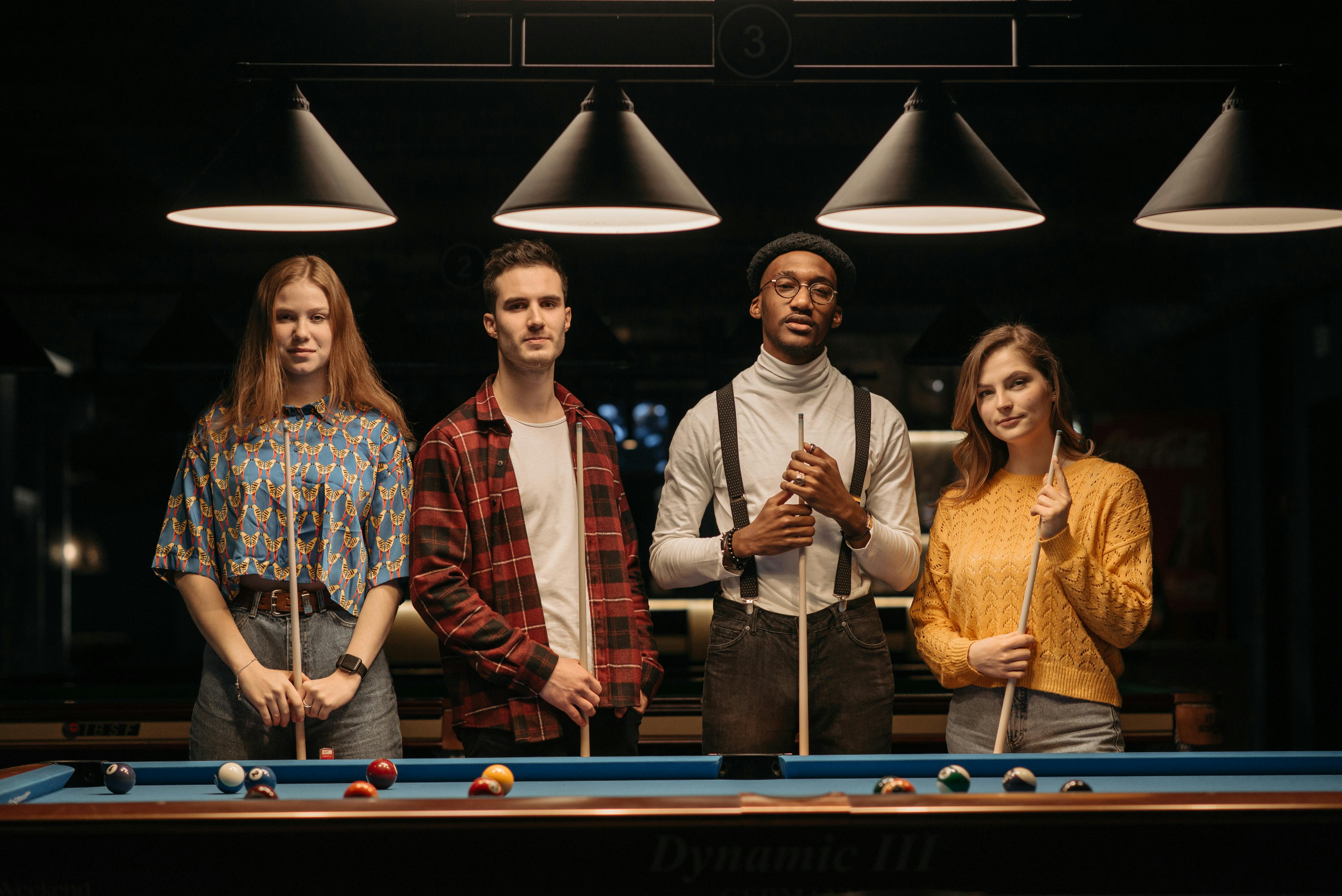 People Standing Beside a Billiard Table · Free Stock Photo