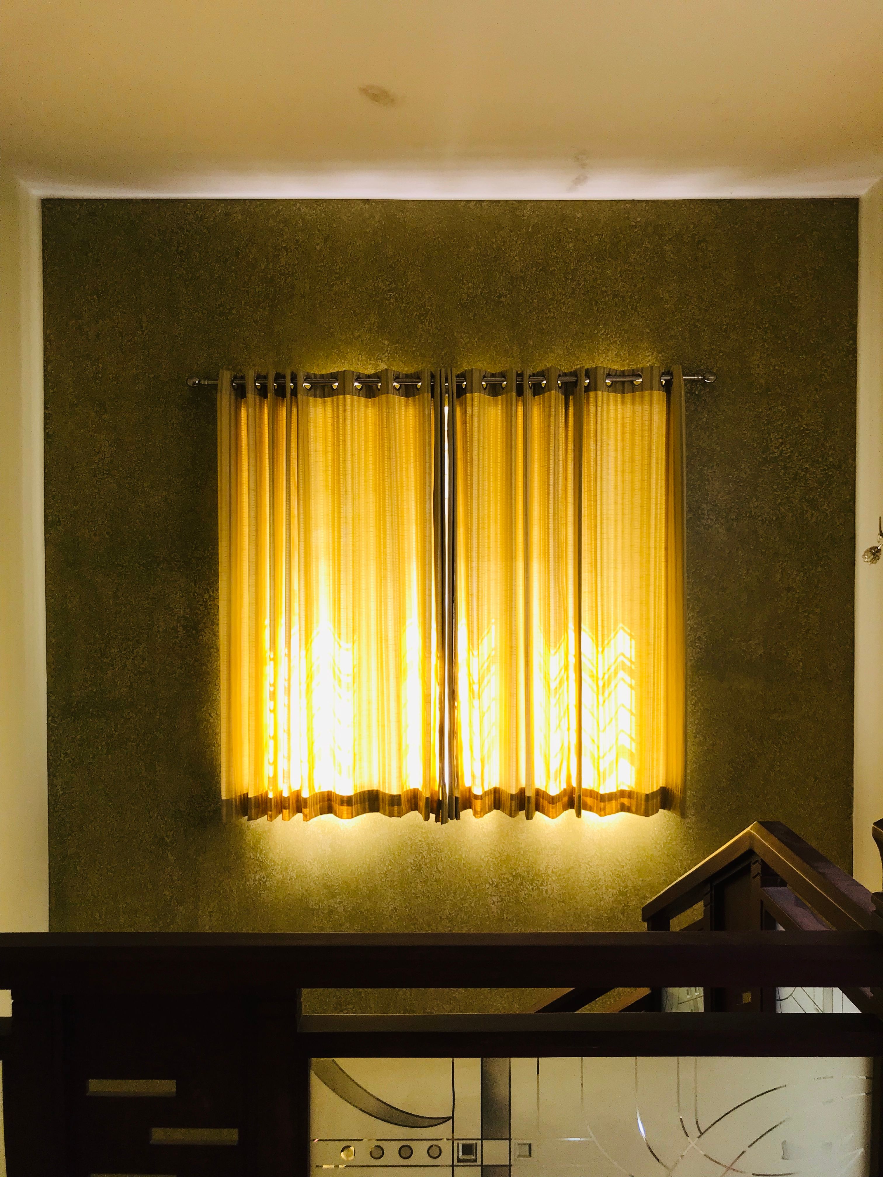 Yellow Window Curtains on a Window · Free Stock Photo