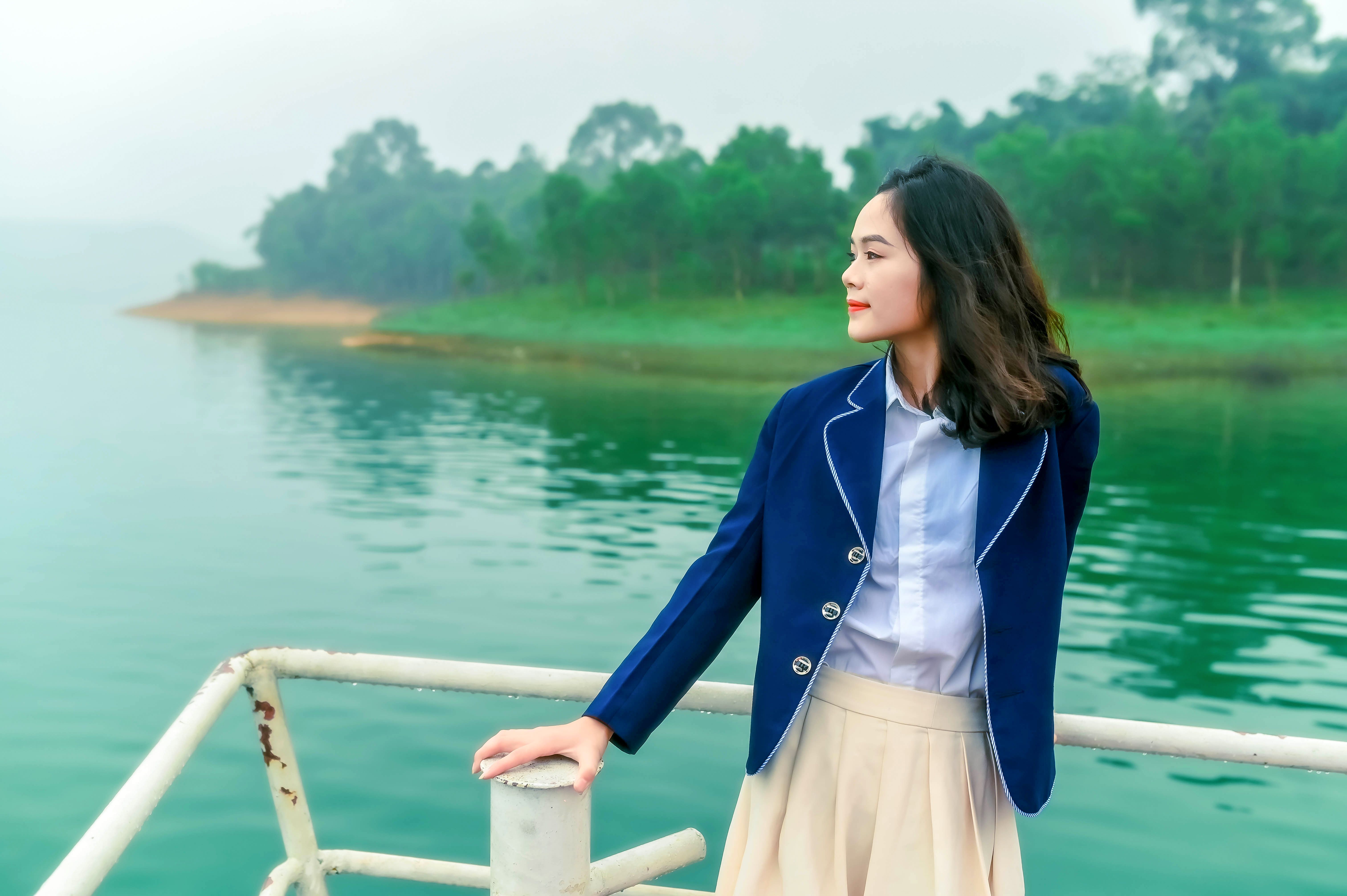 A Girl Leaning on a Hand Rail · Free Stock Photo