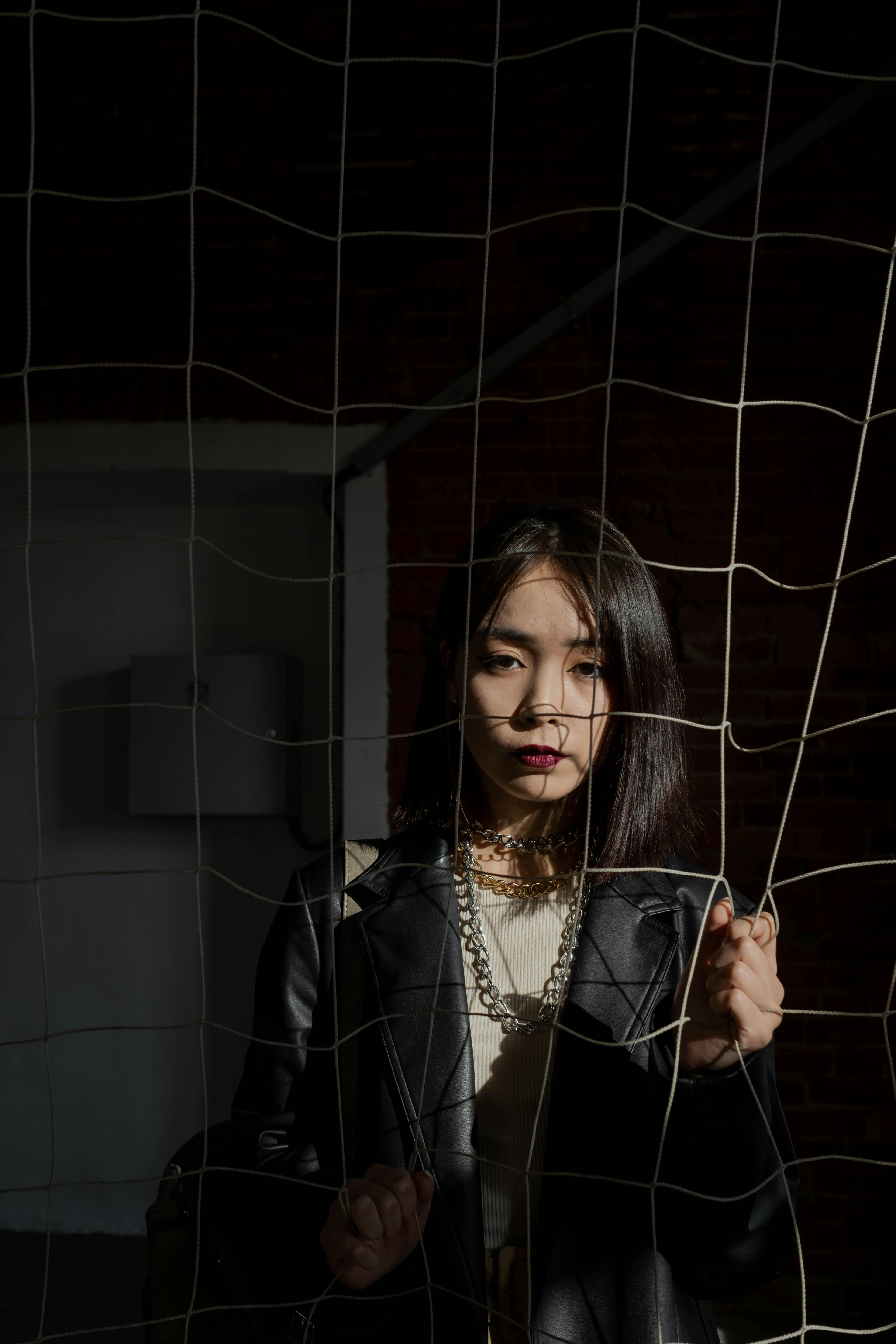 Woman behind a Net · Free Stock Photo