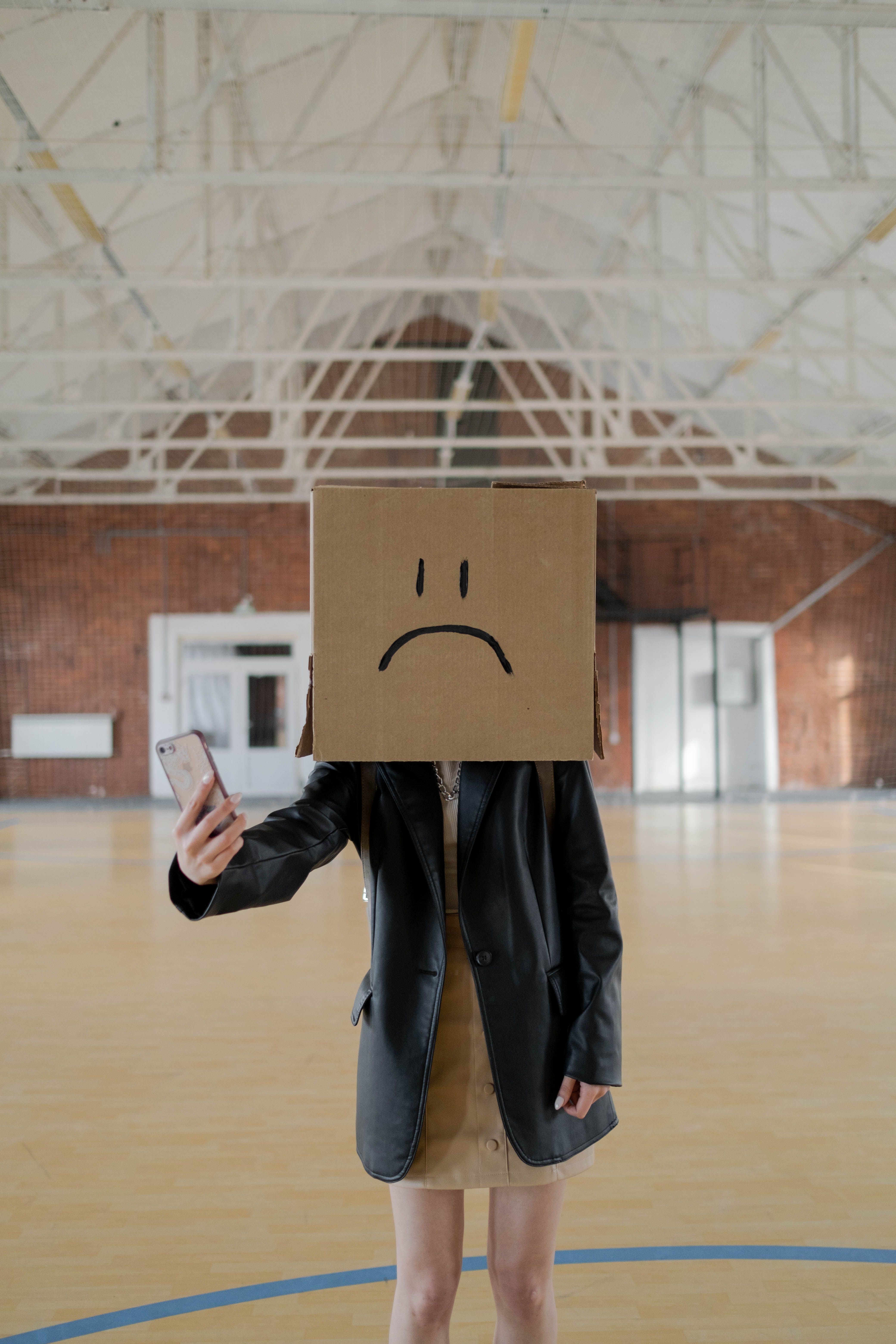 Brown Cardboard Box with Sad Face · Free Stock Photo