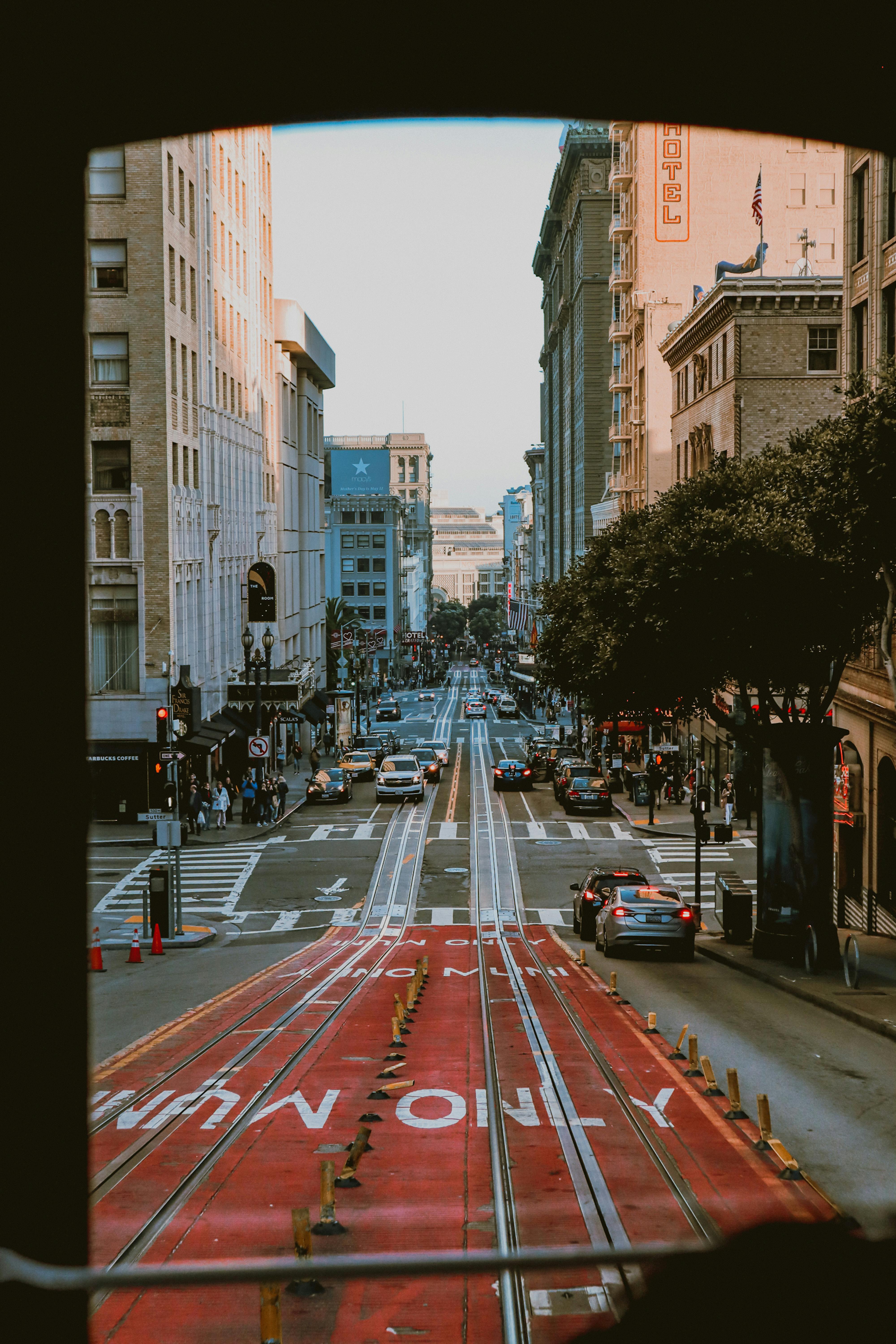 Road with Cars Between Buildings · Free Stock Photo