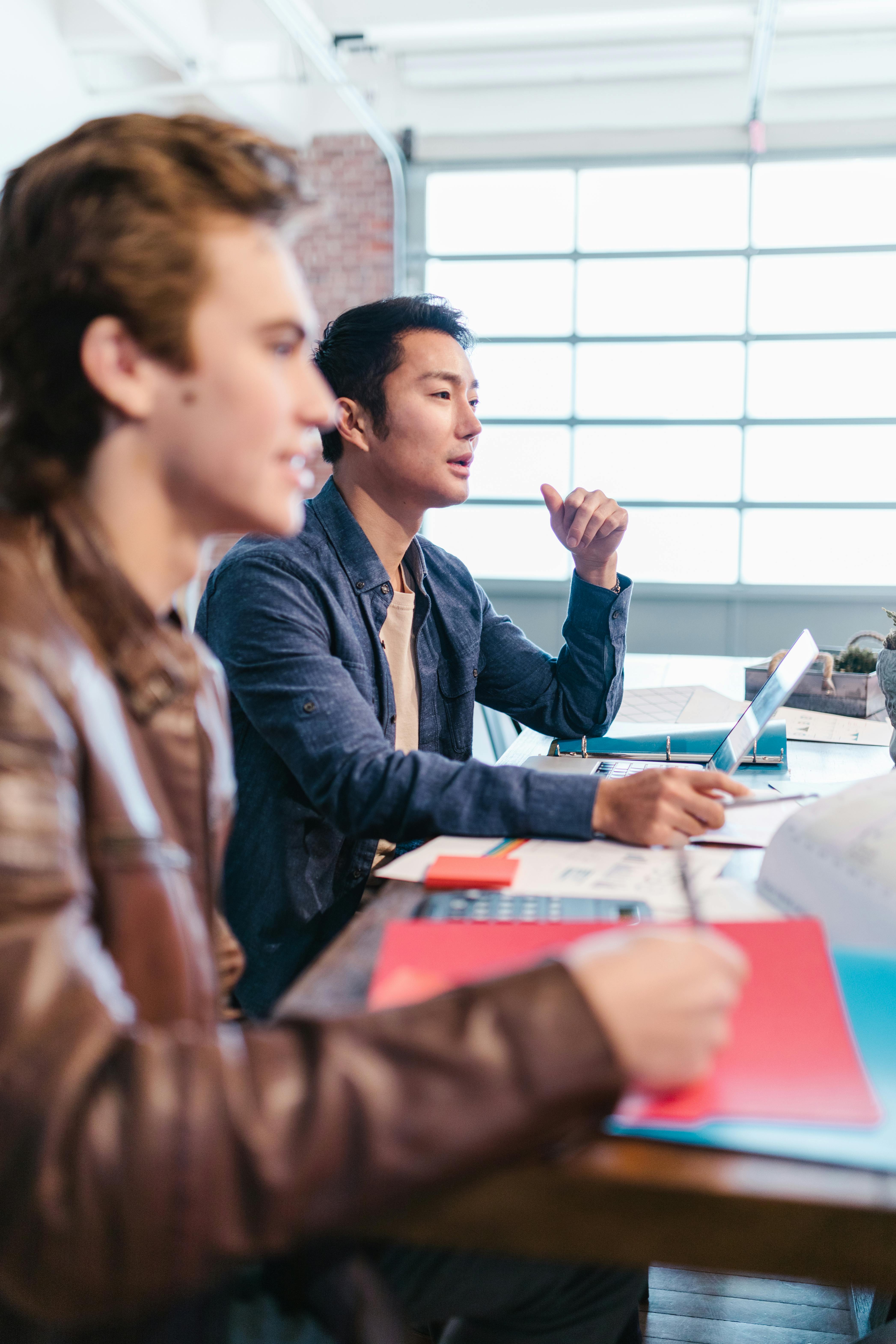Men Sitting at the Table · Free Stock Photo