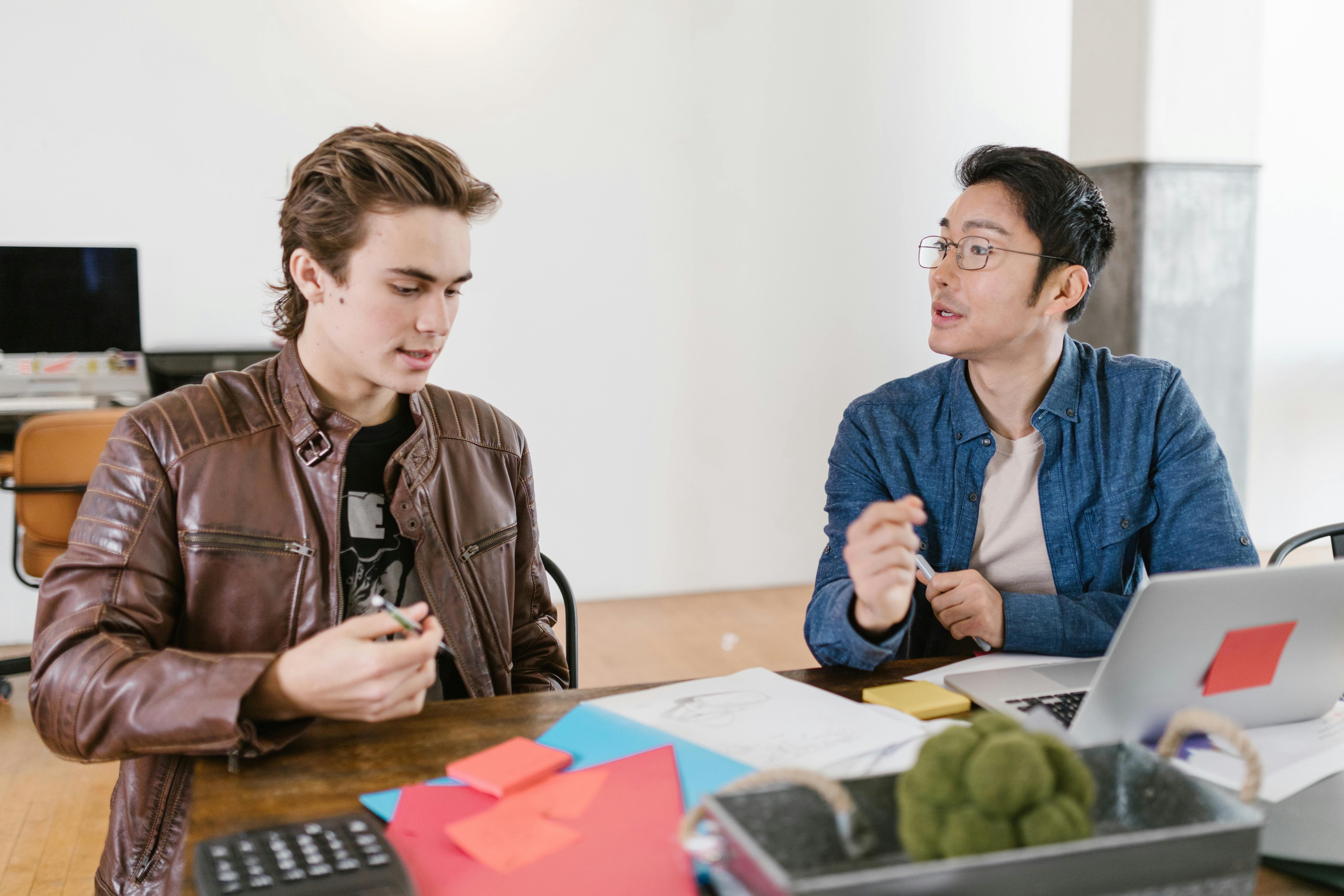 Two Men Discussing Business · Free Stock Photo