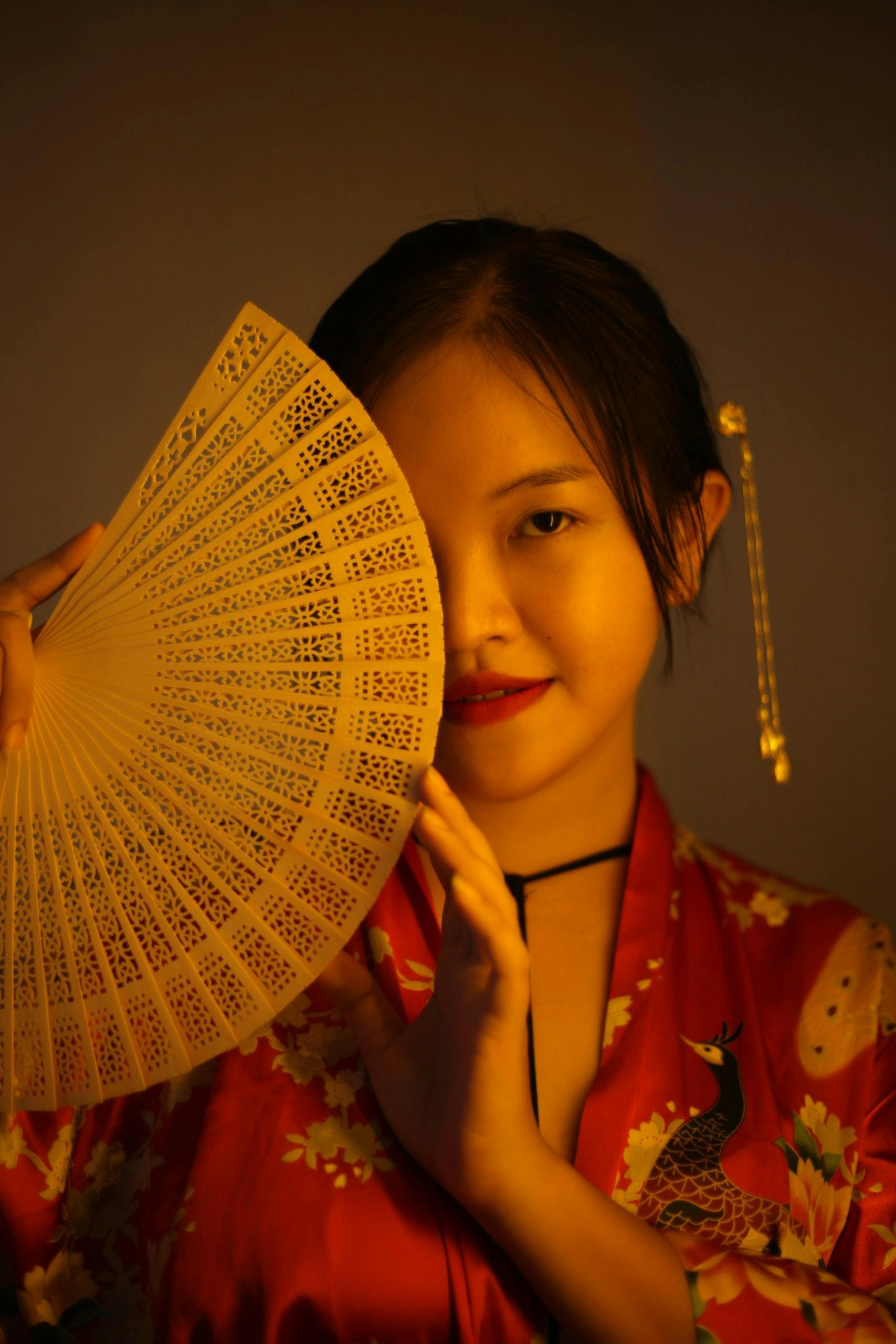 Japanese woman with traditional hand fan · Free Stock Photo