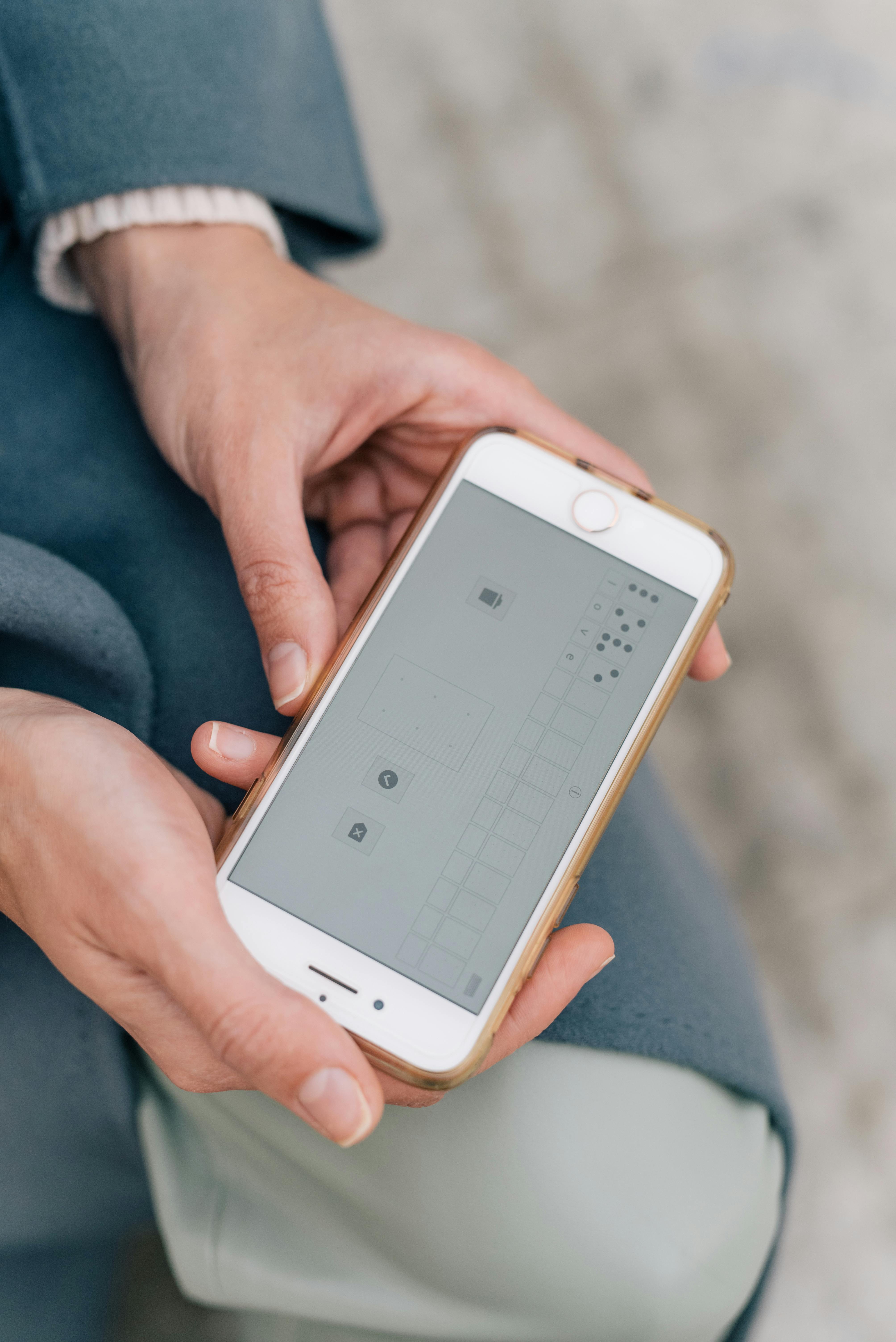 Person Using Mobile Phone · Free Stock Photo