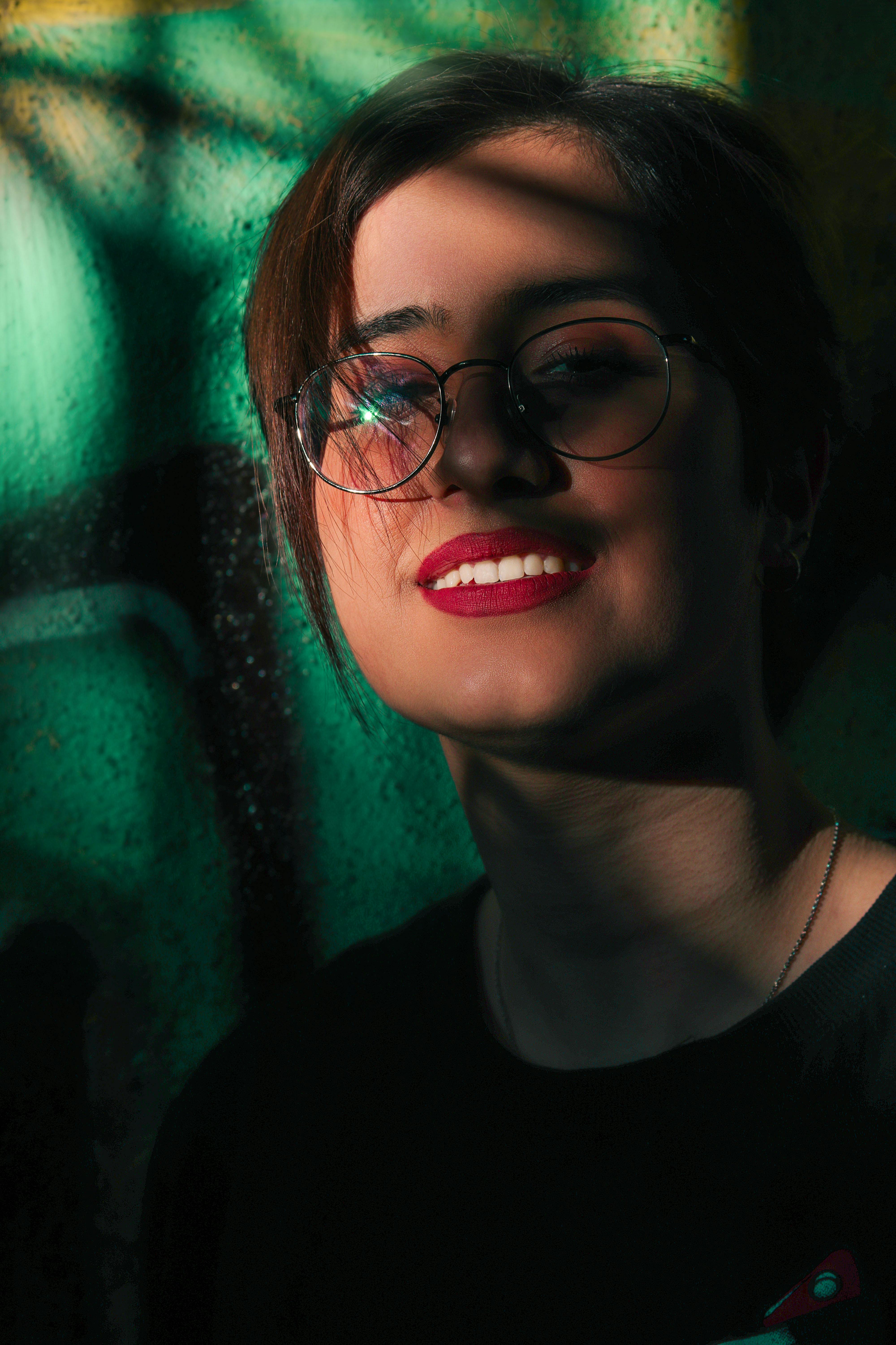 Person Holding Black Framed Eyeglasses · Free Stock Photo