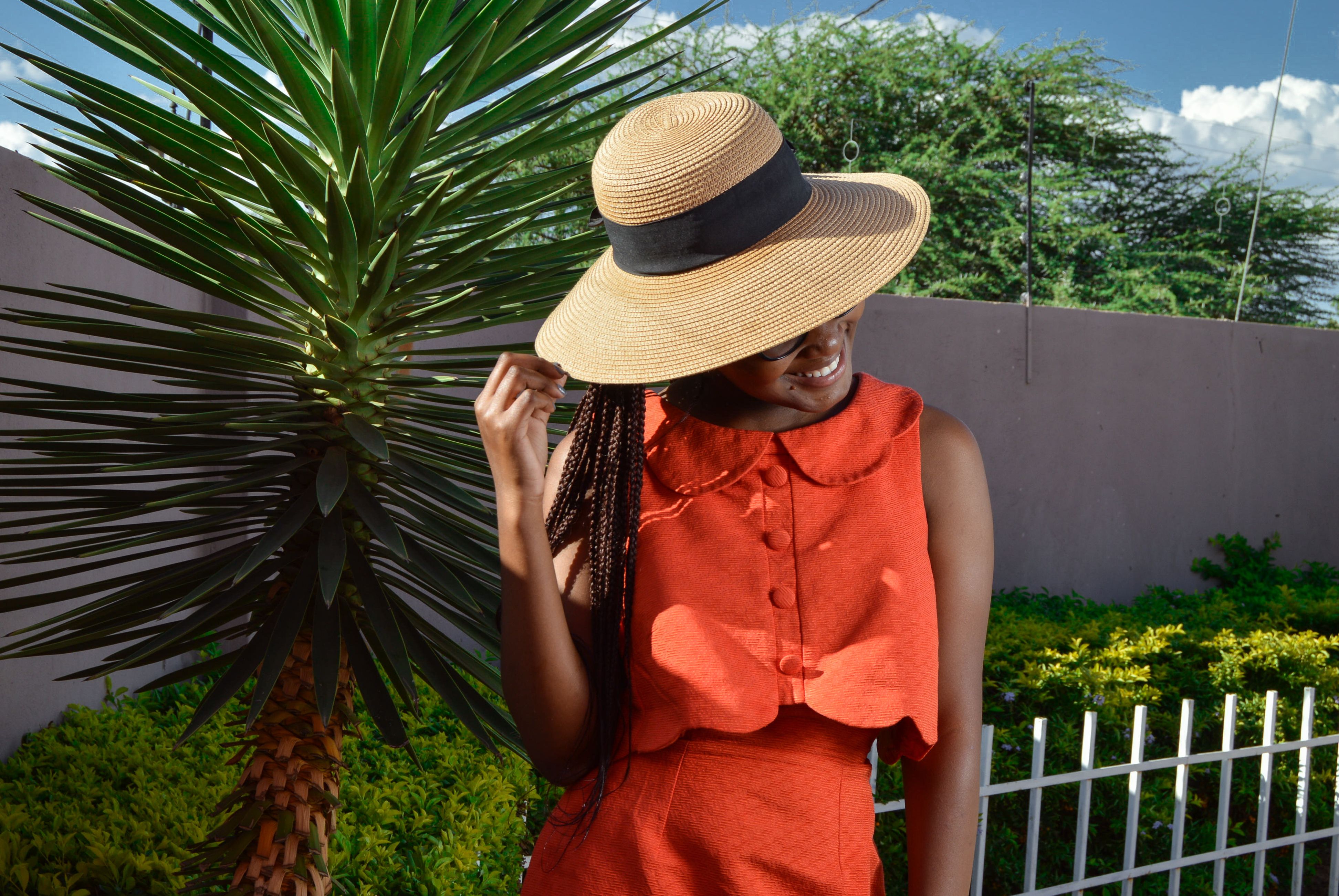 Woman Wearing a Sun Hat · Free Stock Photo