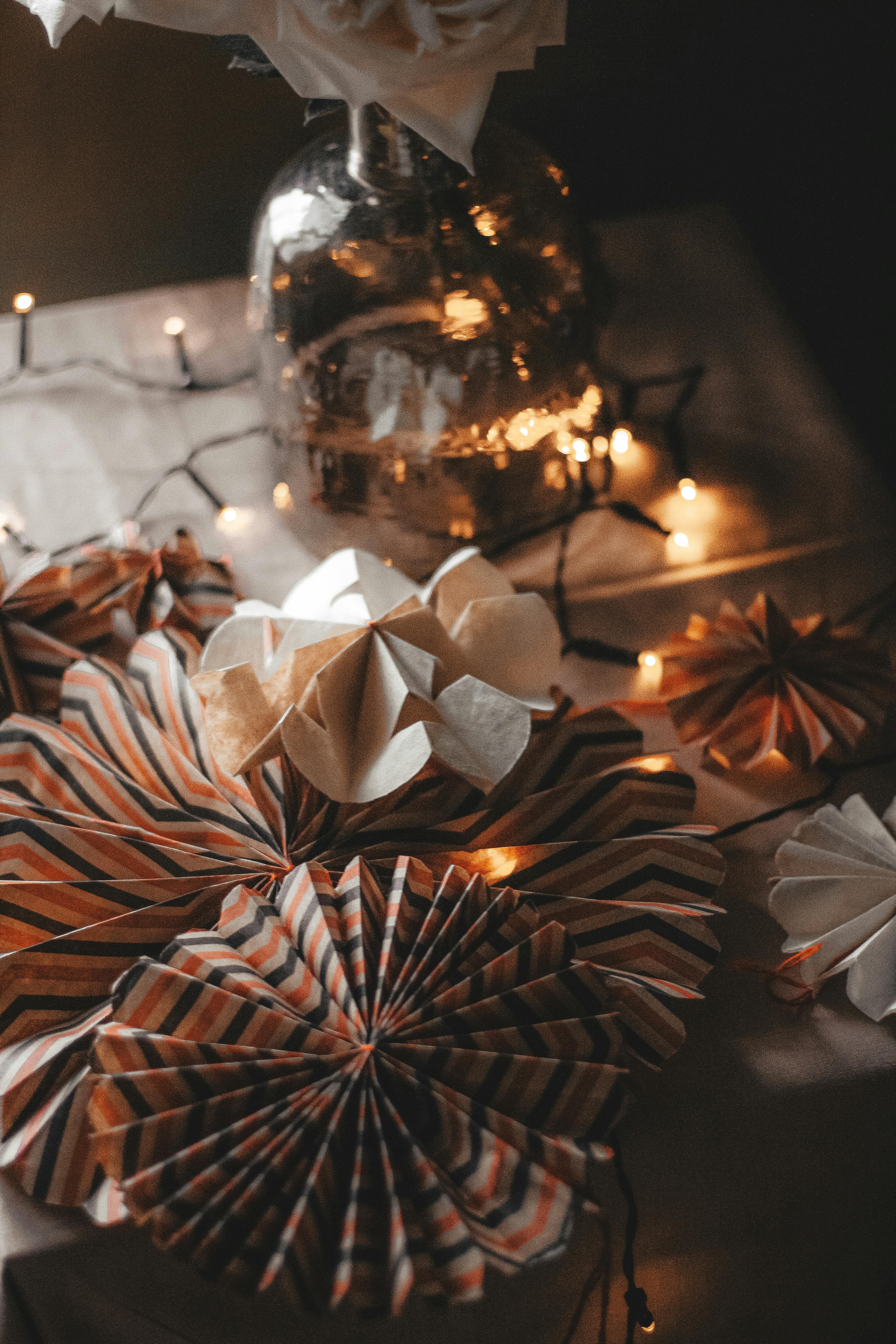 Handmade paper decorations near garland · Free Stock Photo