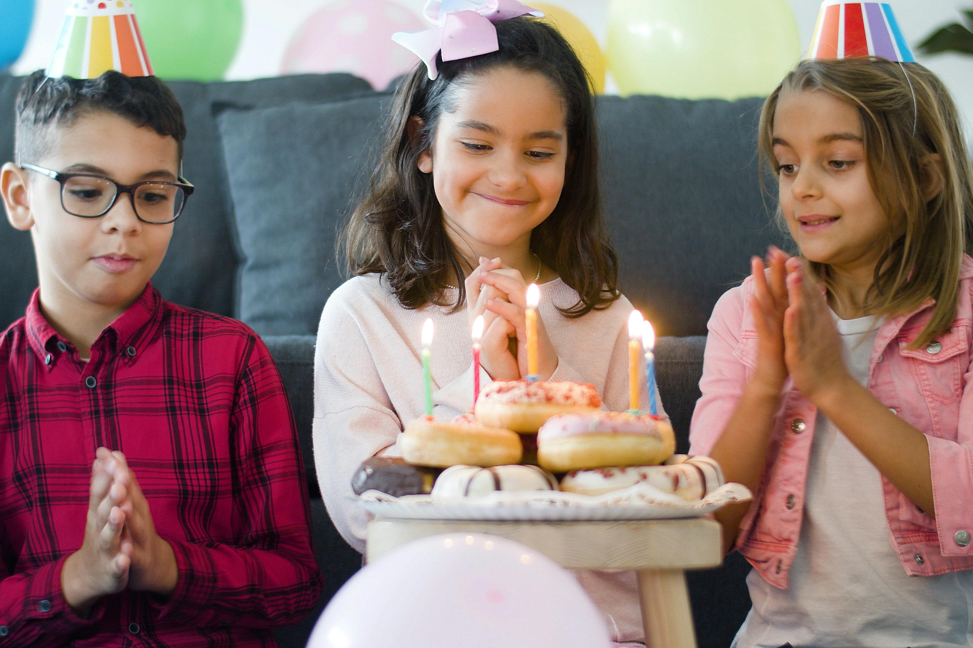 Children eating Cake on a Birthday Party · Free Stock Photo