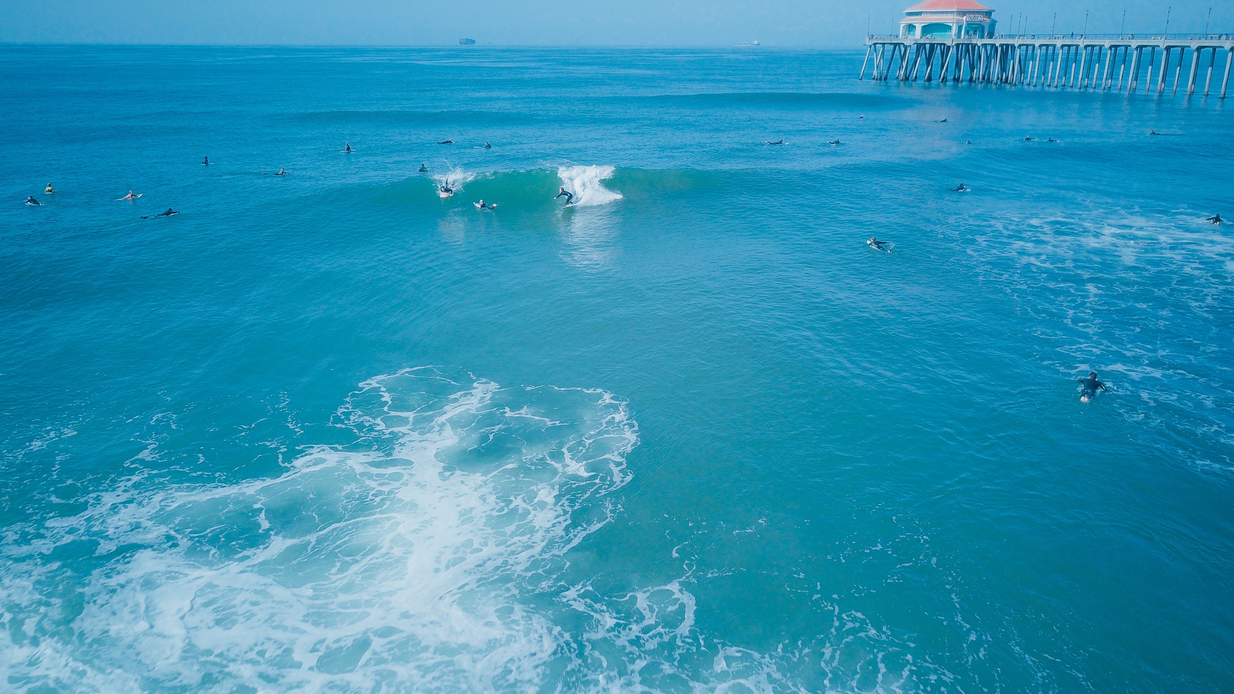 People Surfing in the Sea · Free Stock Photo