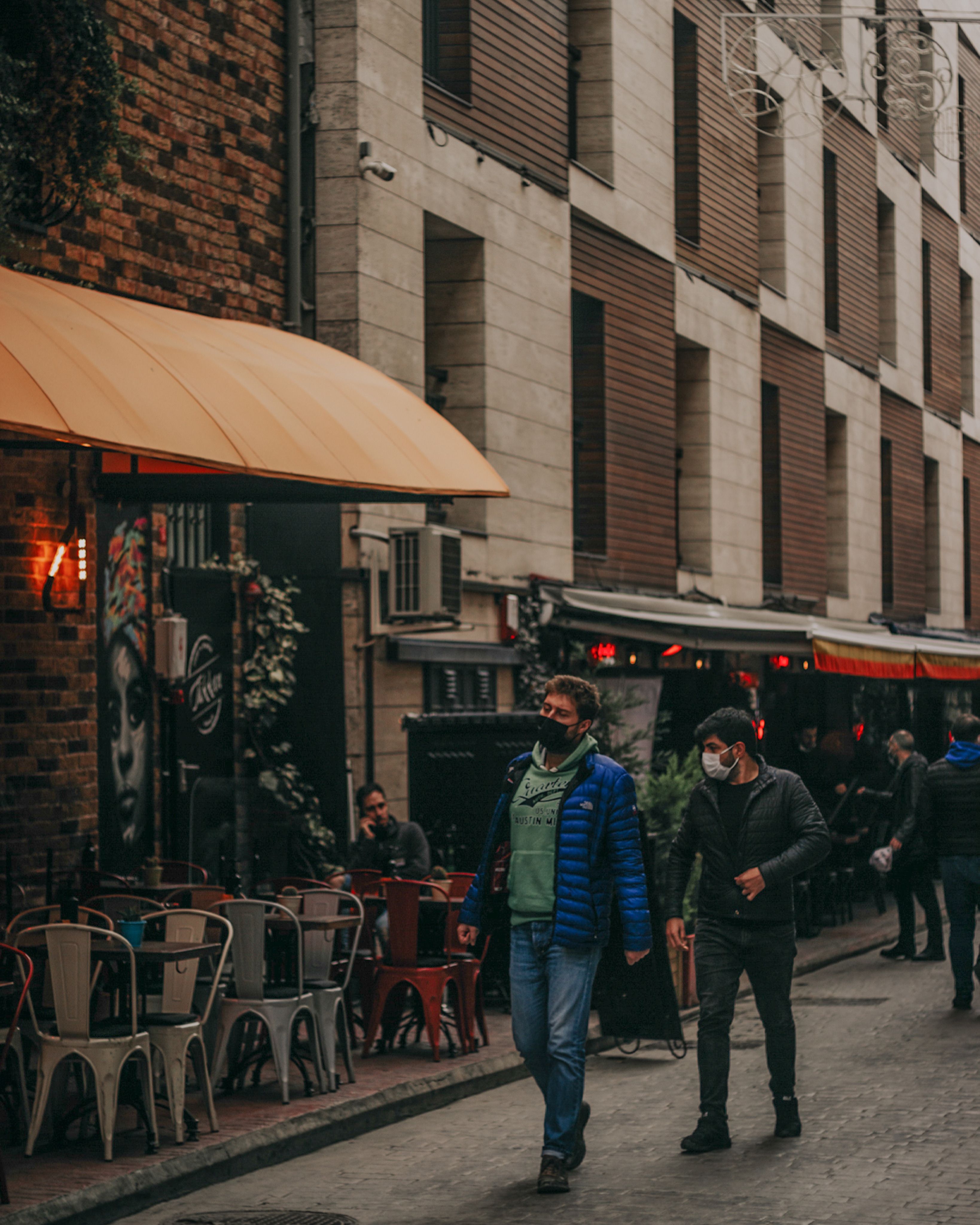 People Wearing Face Masks Walking in the Street · Free Stock Photo