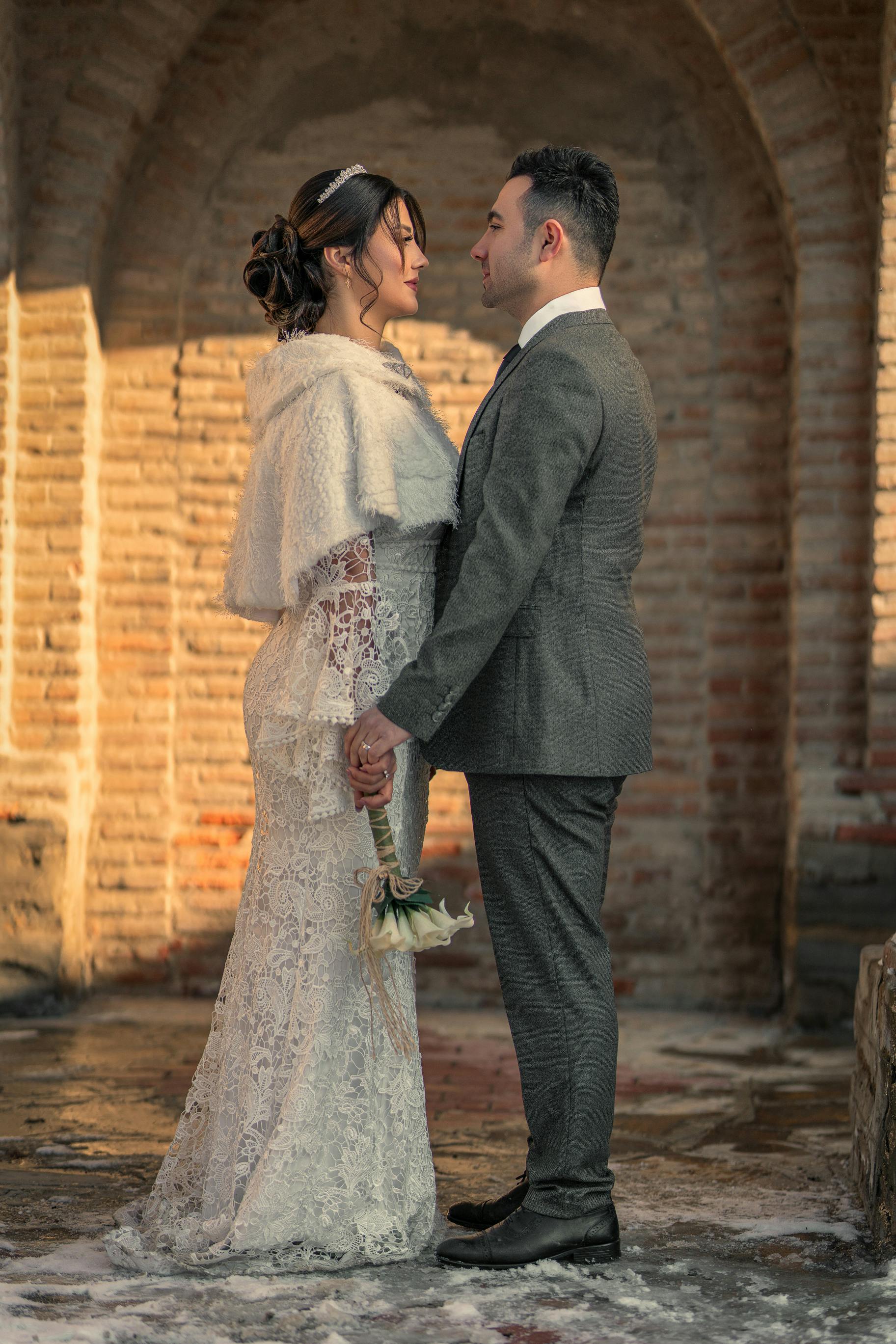 A Groom Kissing the Bride on the Head · Free Stock Photo