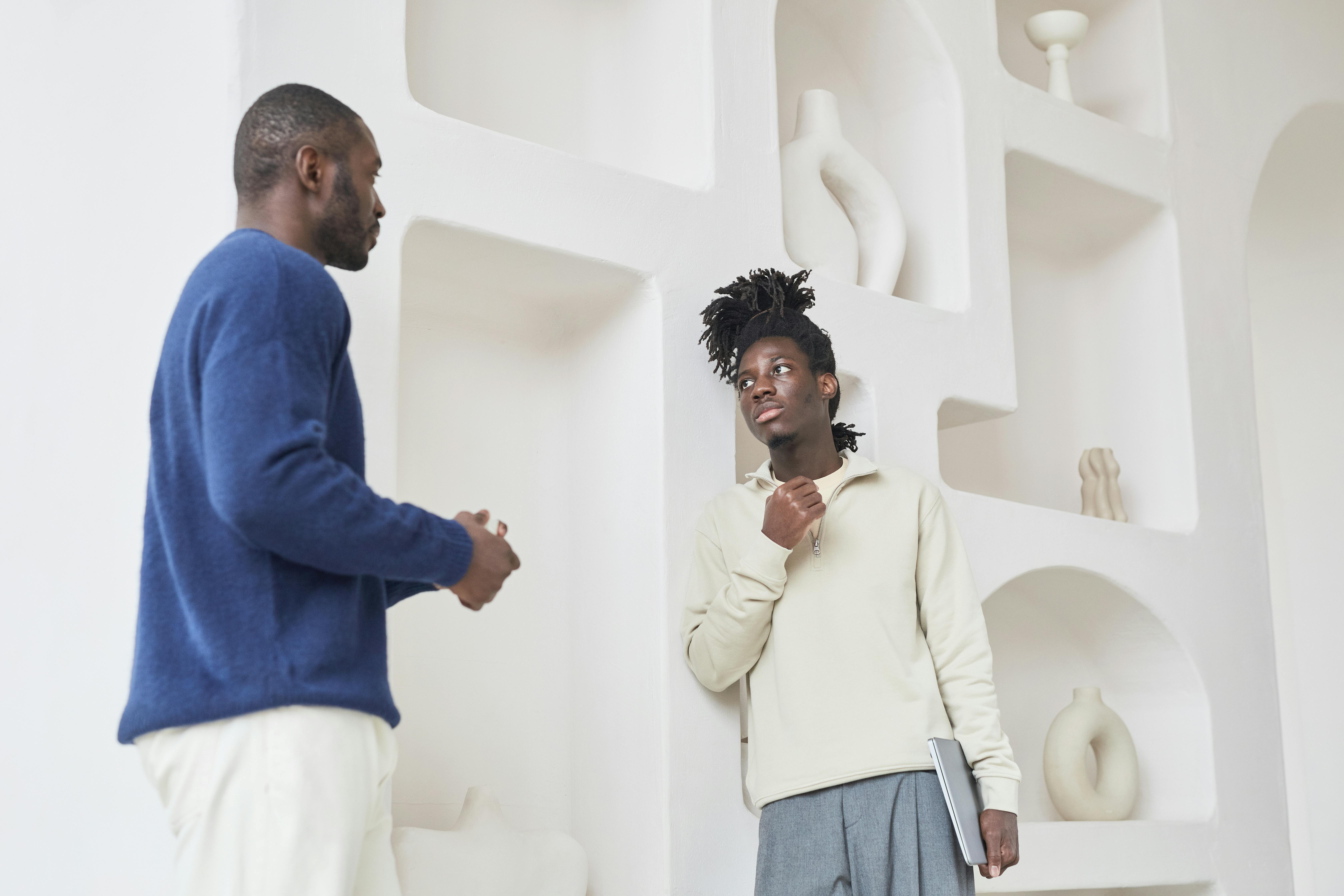 Two Men Talking to Each Other · Free Stock Photo