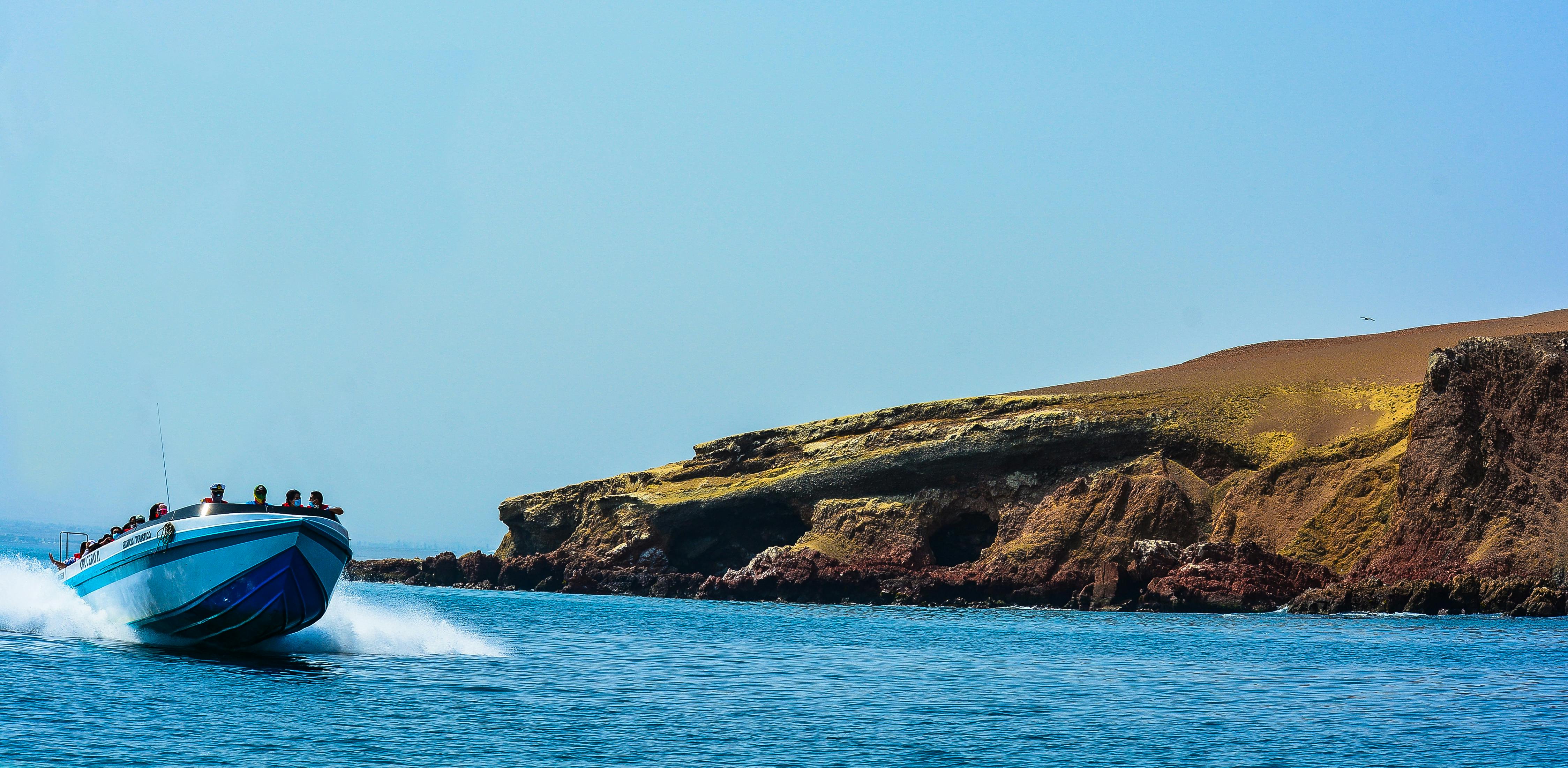 Two Men Riding a Speedboat · Free Stock Photo