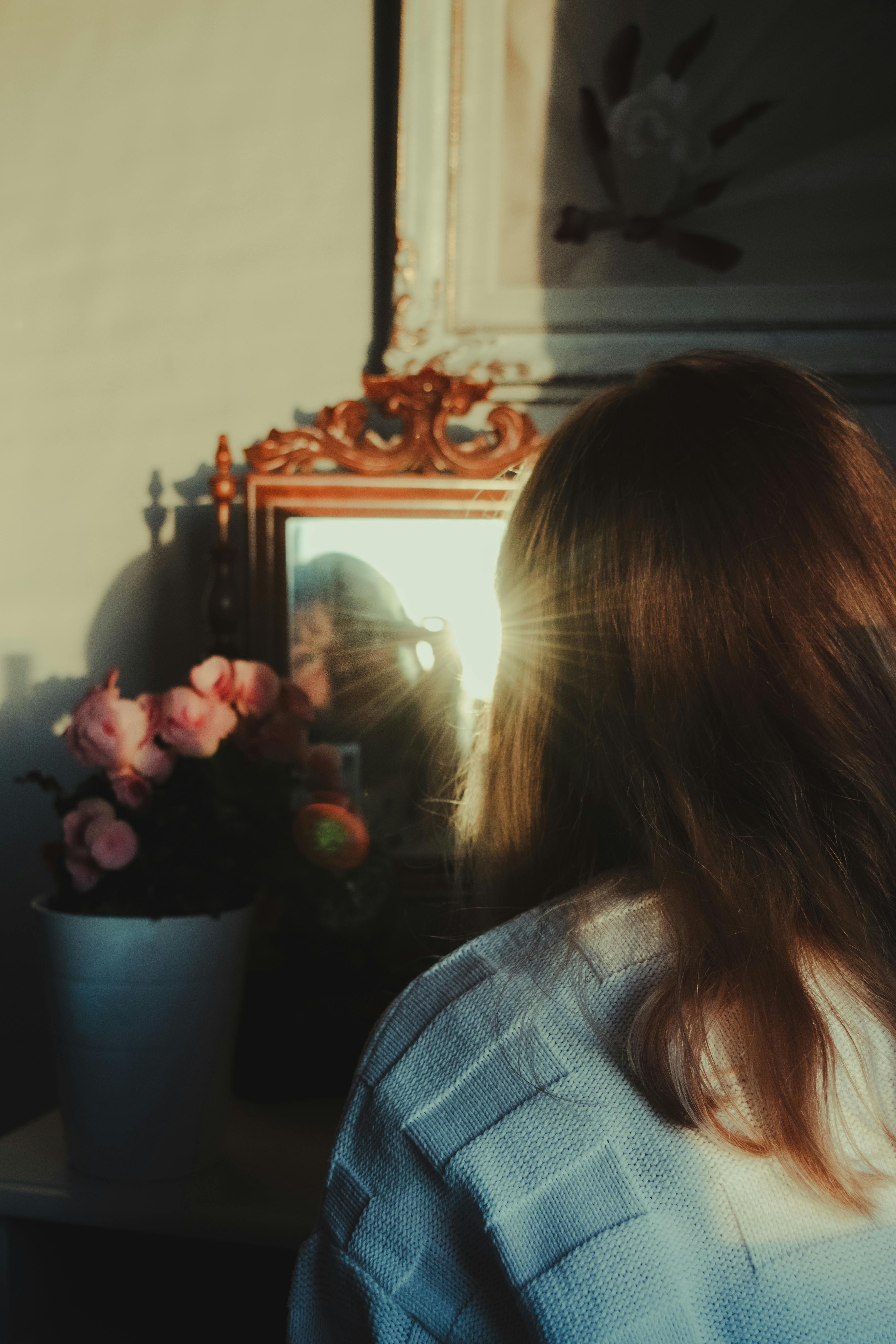A Woman Reflection on a Mirror · Free Stock Photo