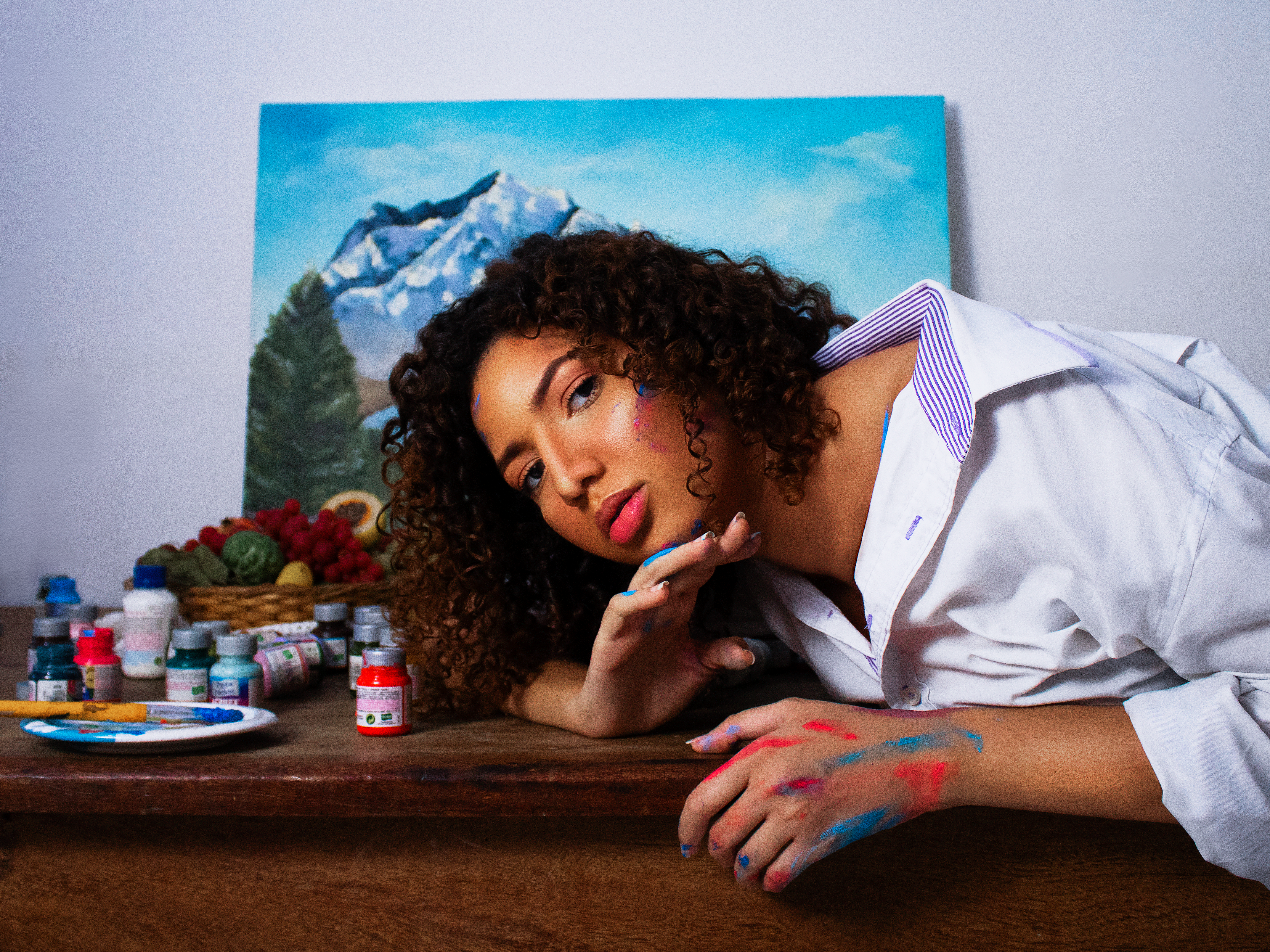 A Woman Beside a Paint · Free Stock Photo