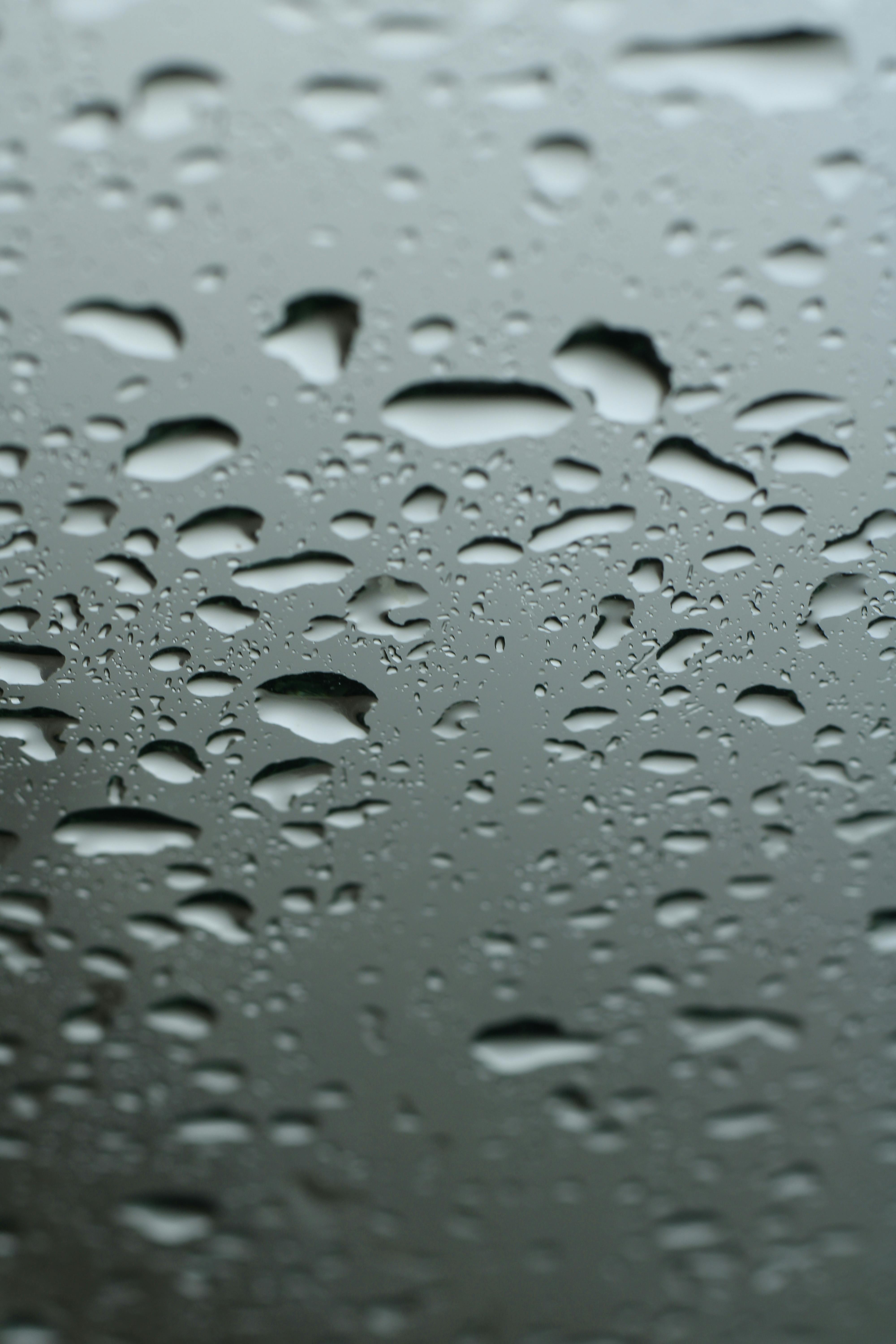 Water Droplets on Glass Window · Free Stock Photo