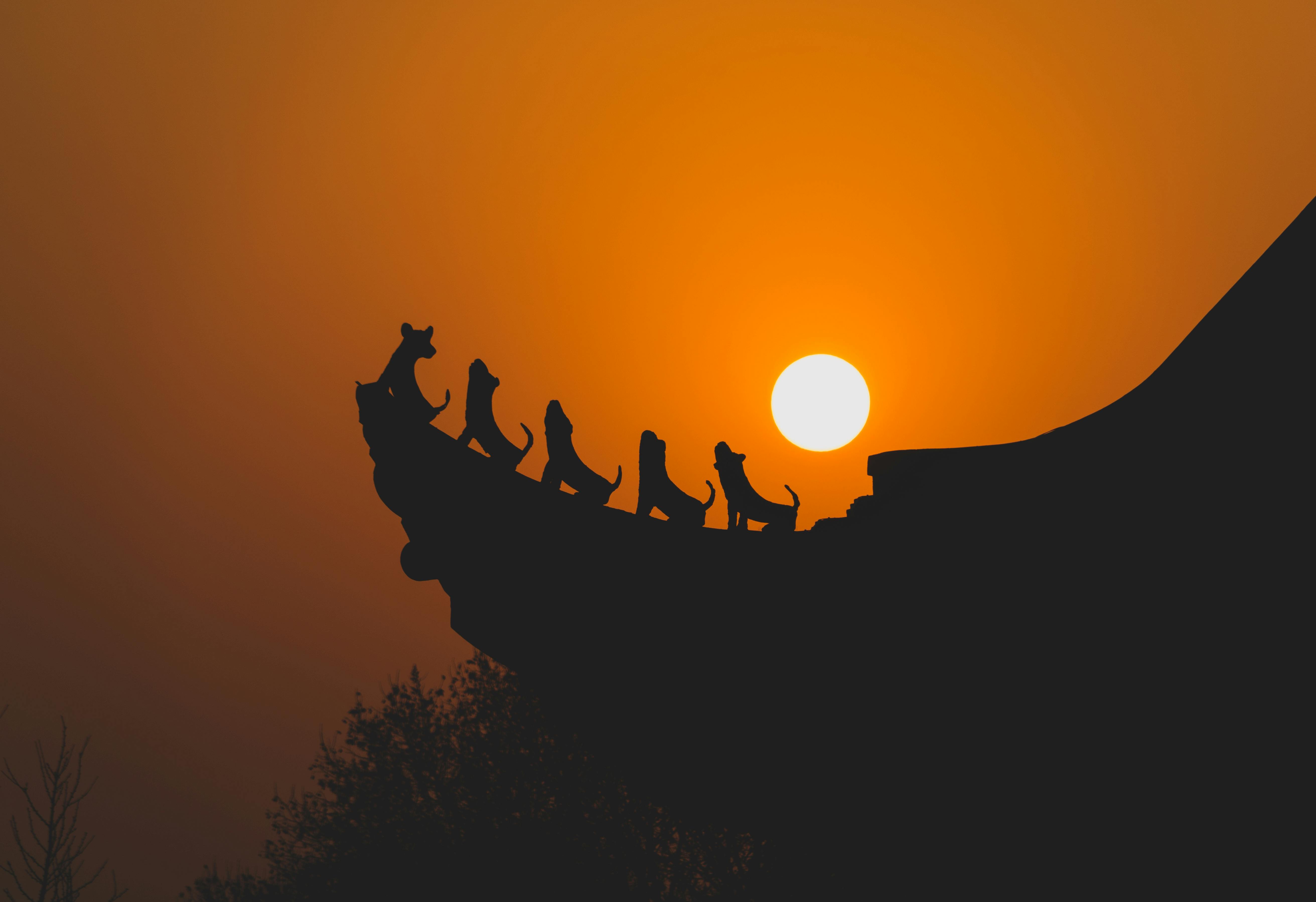 Woman Statuette during Golden Hour · Free Stock Photo