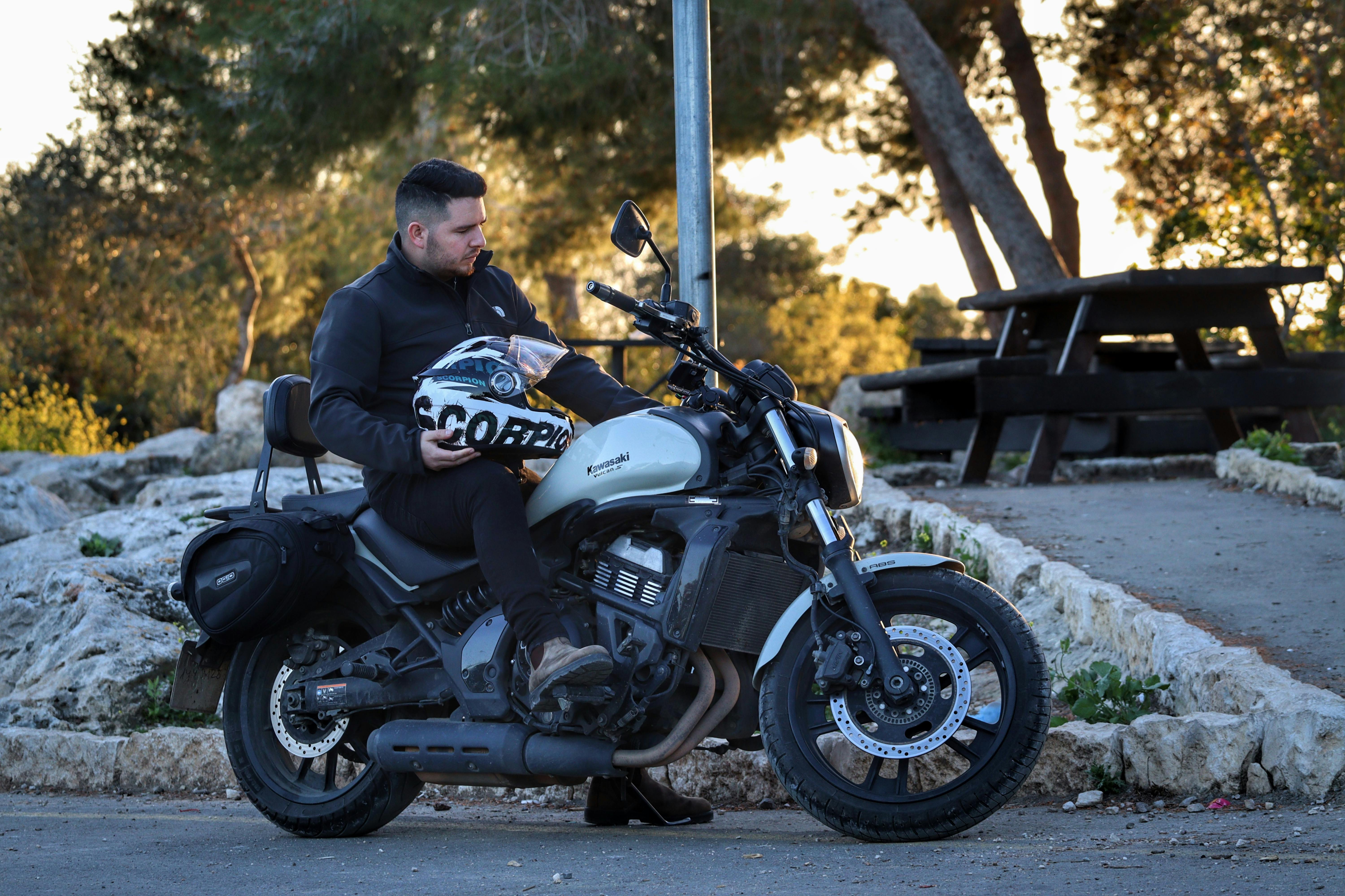 A Man Riding a Motorcycle · Free Stock Photo