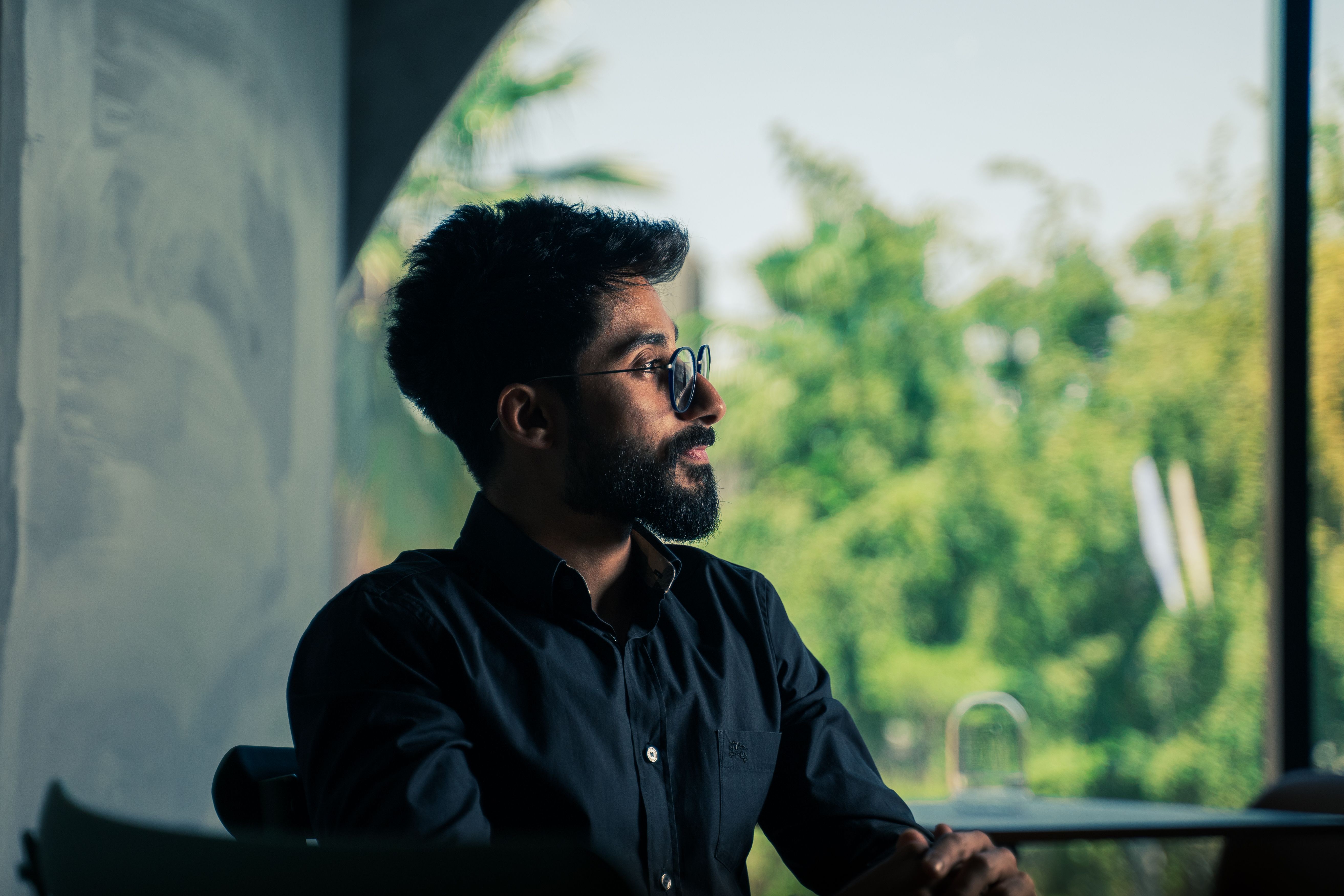 Man Looking Through Window · Free Stock Photo
