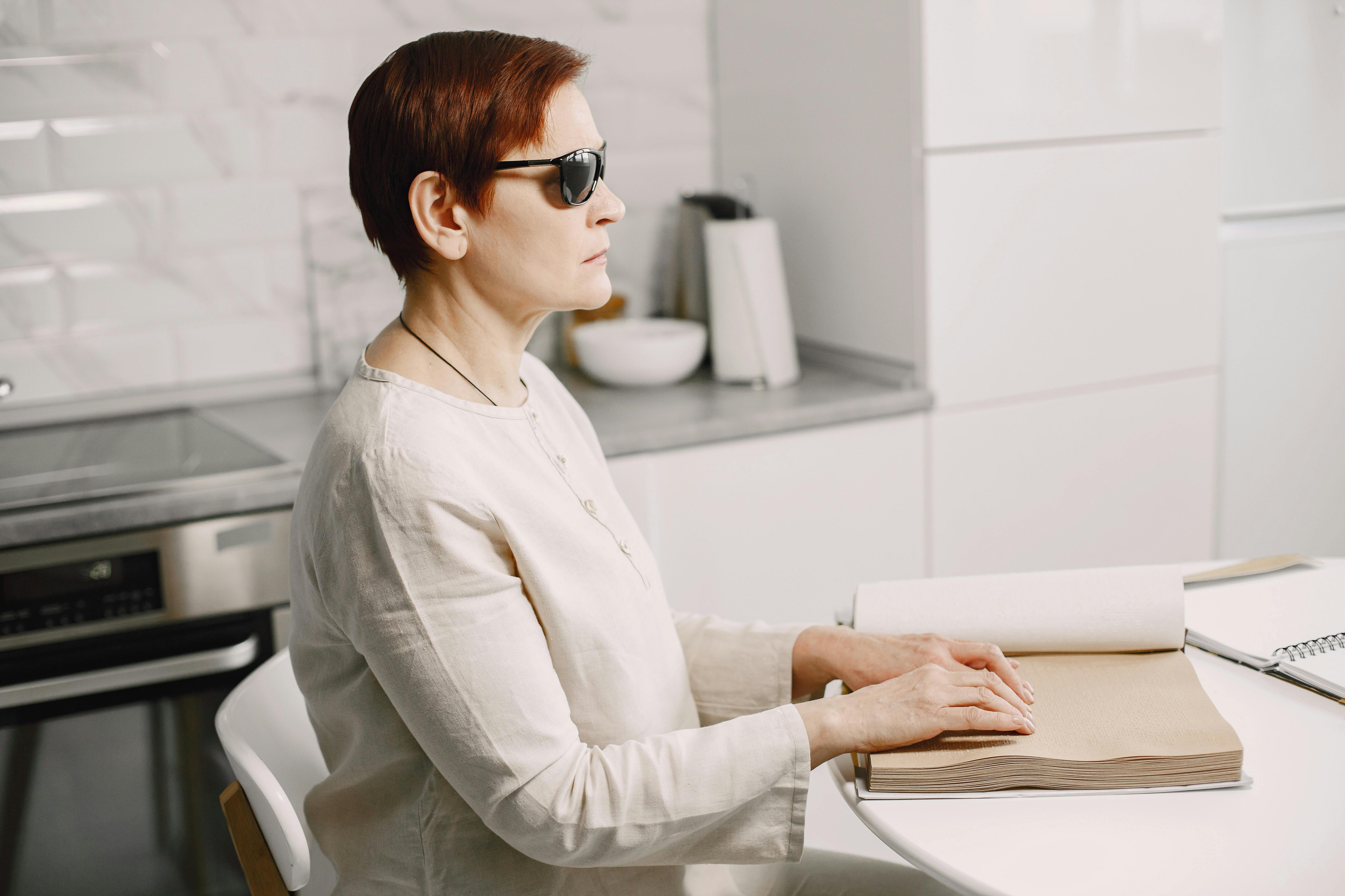 Blind Woman with Book · Free Stock Photo
