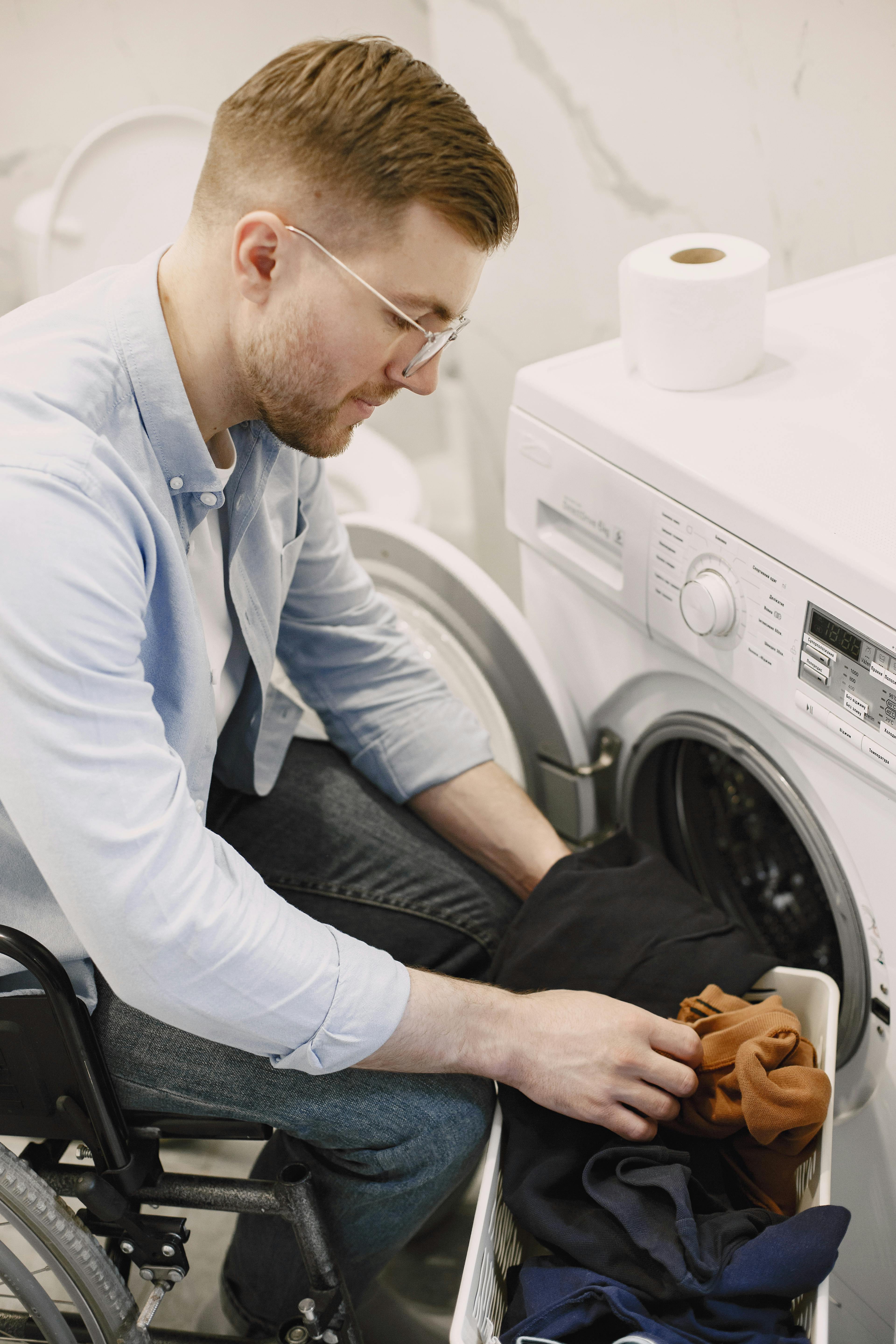 Man Doing his Laundry · Free Stock Photo