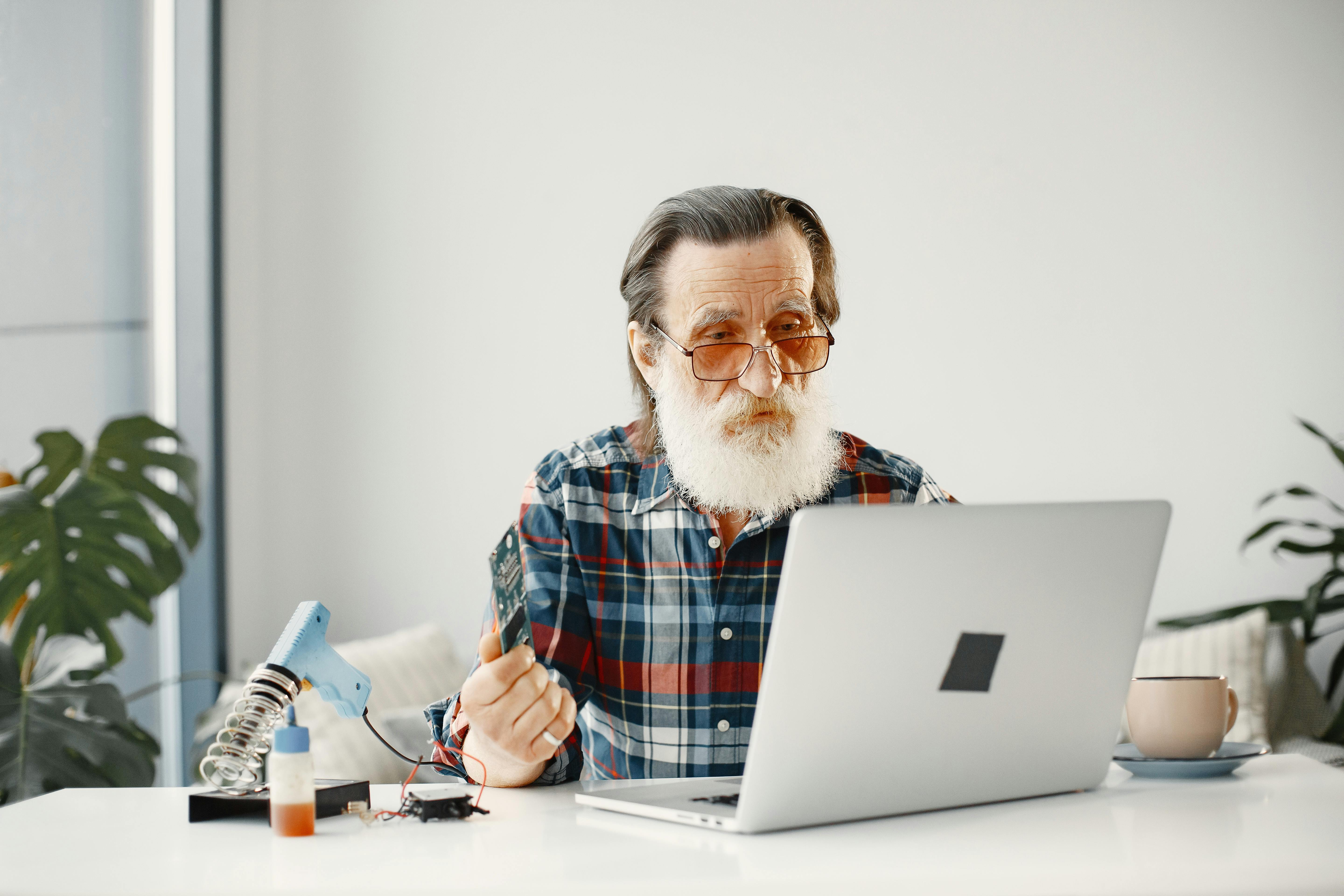 Elderly Couple Sitting on the Sofa · Free Stock Photo
