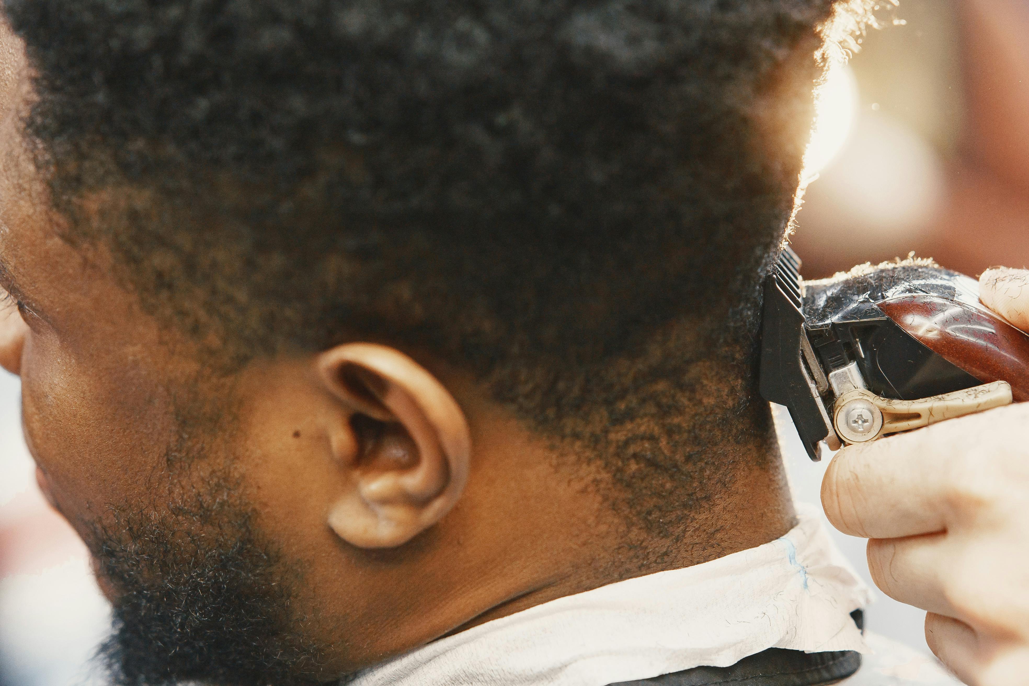 Man Getting a Haircut · Free Stock Photo