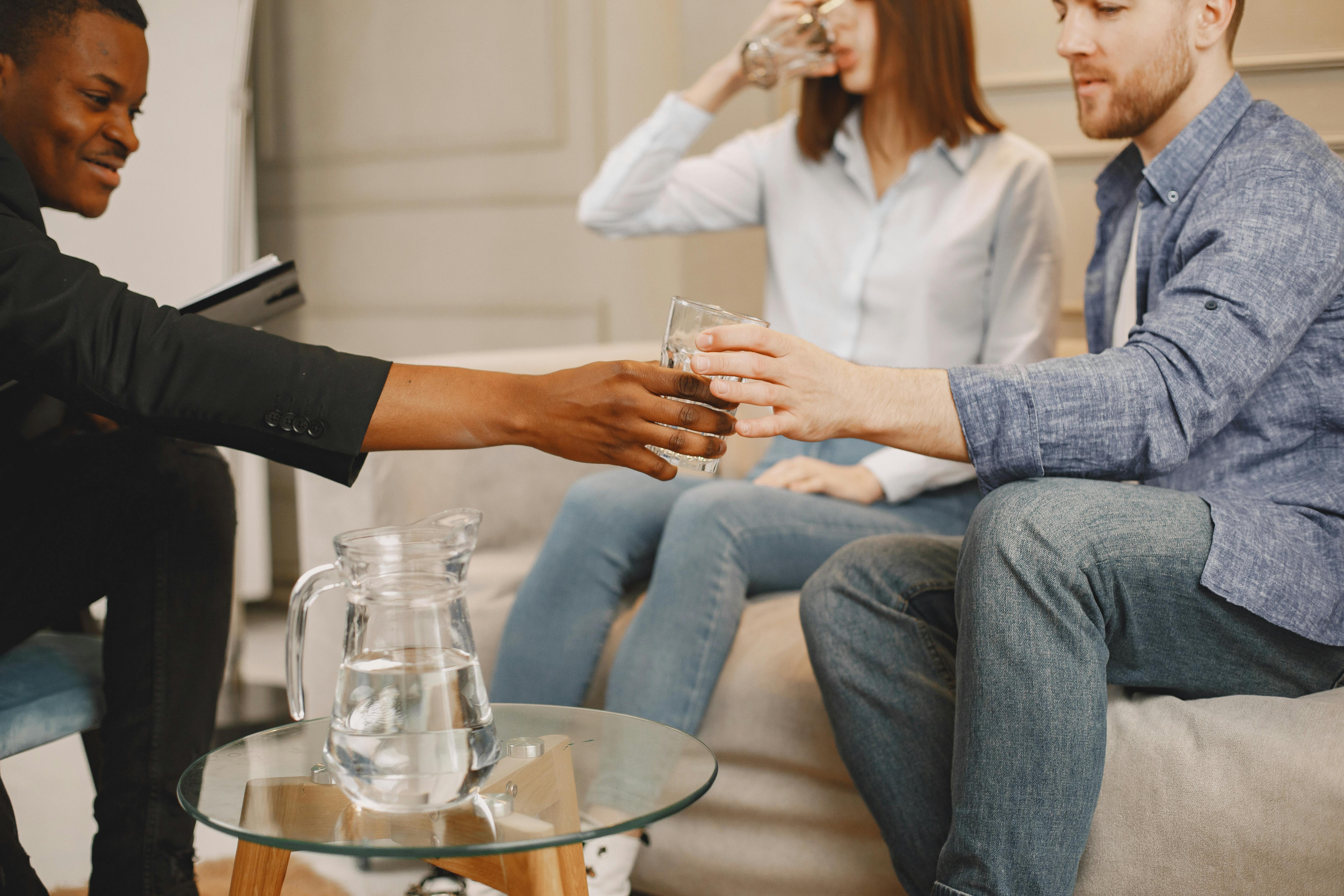 Handing A Glass Of Water To Someone Photos, Download The BEST Free ...