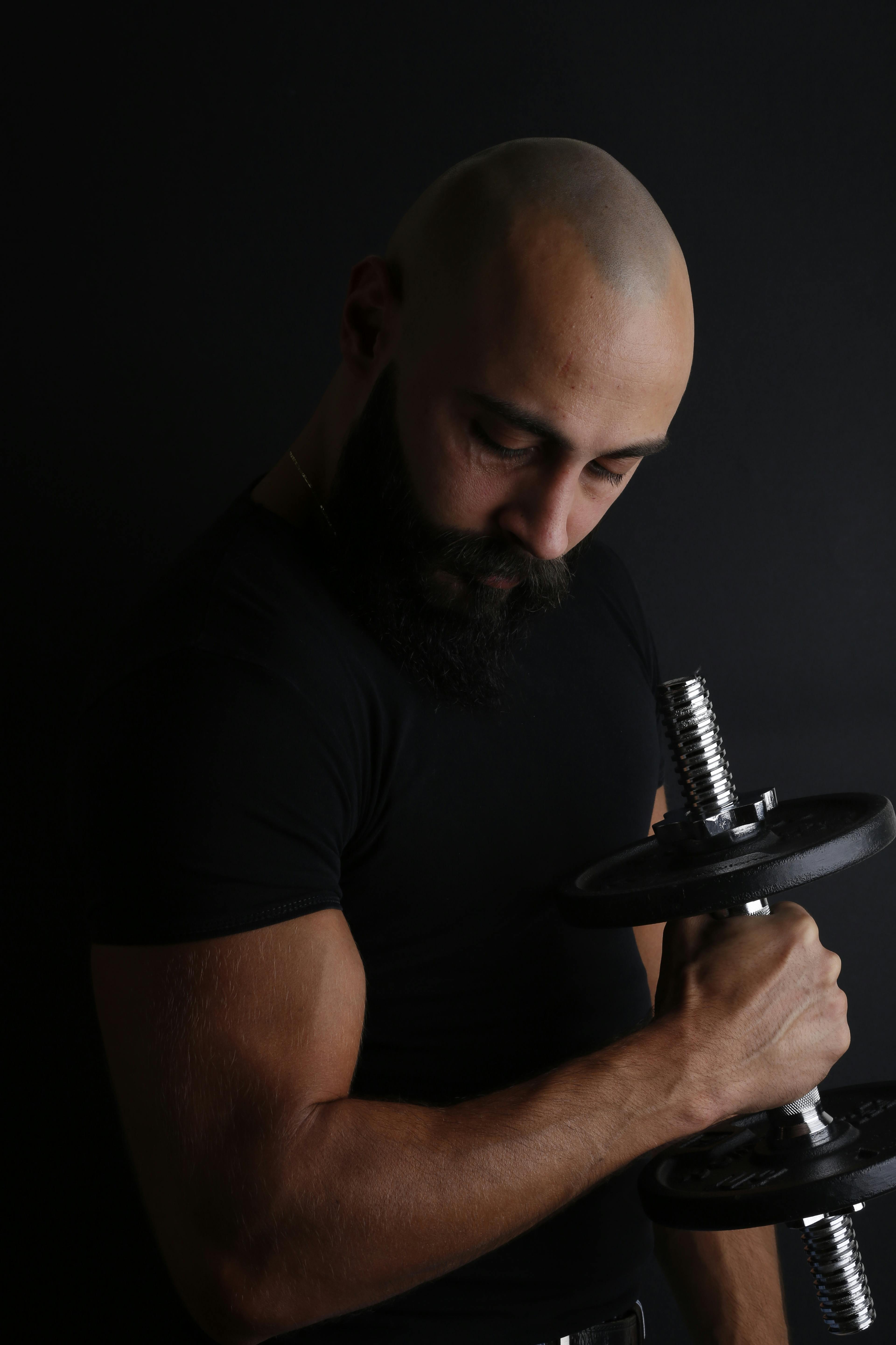 A Shirtless Man Looking Over Shoulder · Free Stock Photo