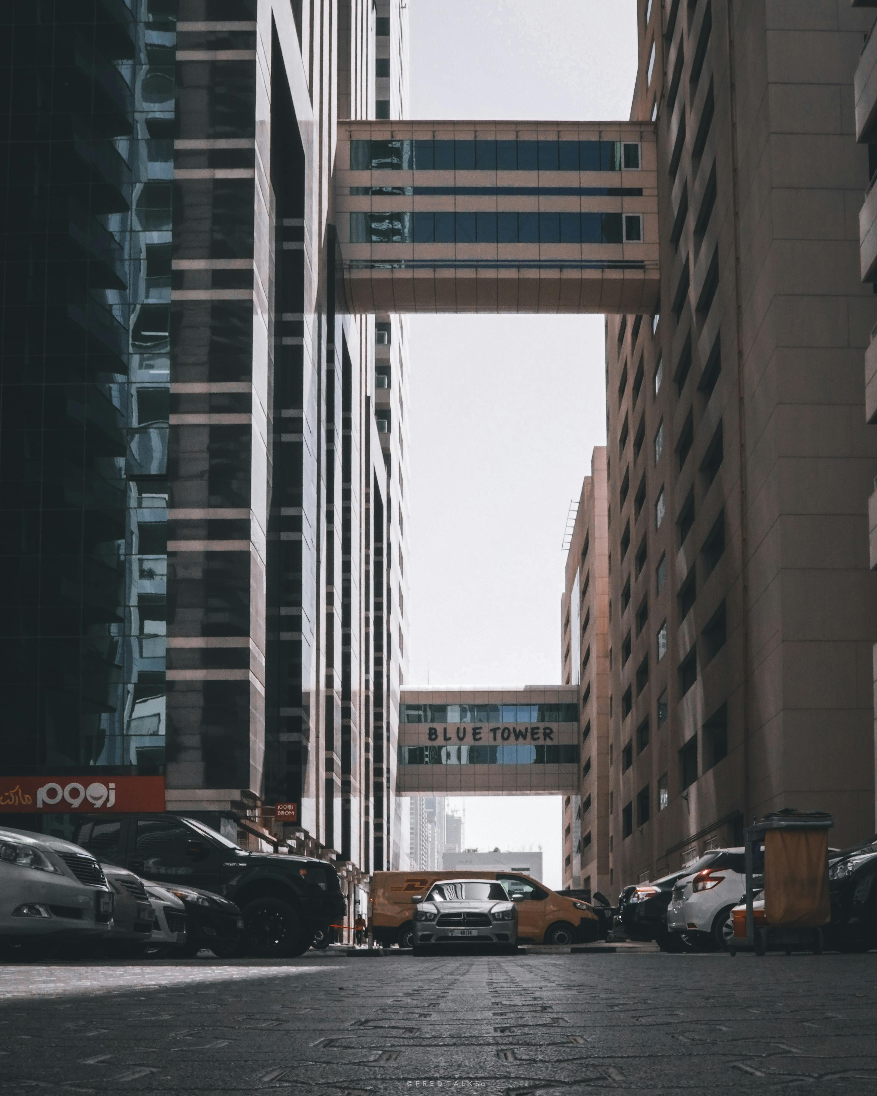 Car Park in Between Buildings · Free Stock Photo