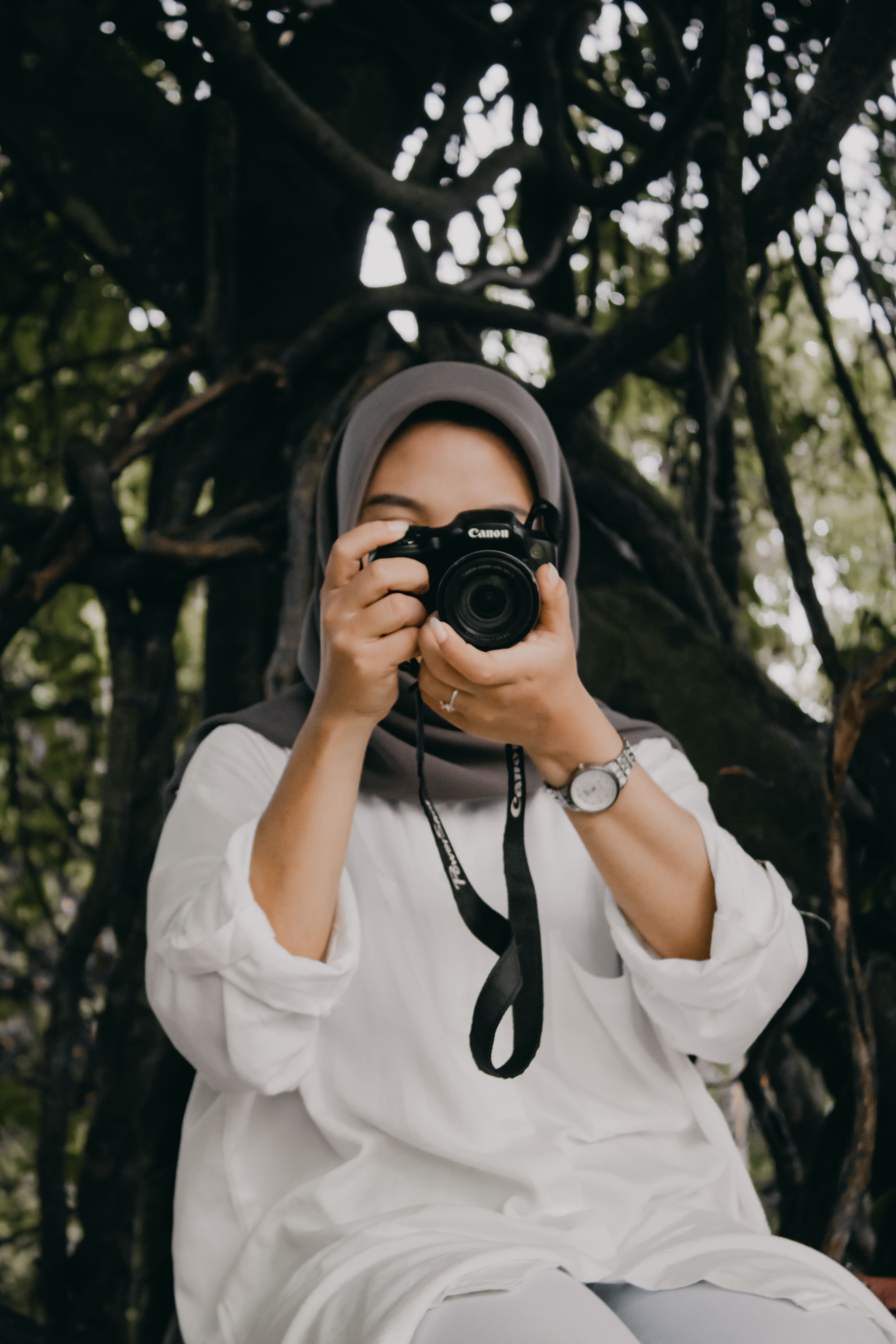 Person Taking a Picture Using DSLR Camera · Free Stock Photo