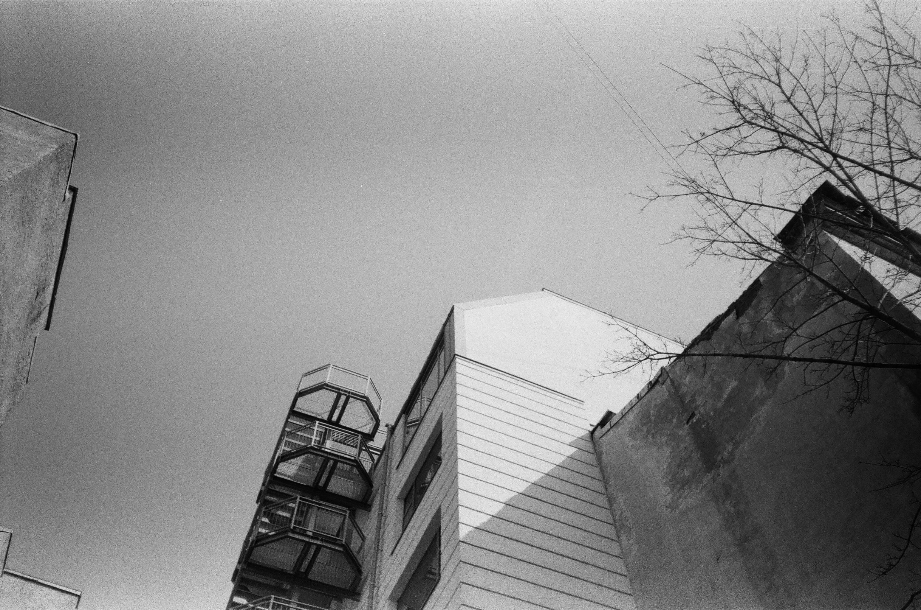 Grayscale Photo of Concrete Wall · Free Stock Photo