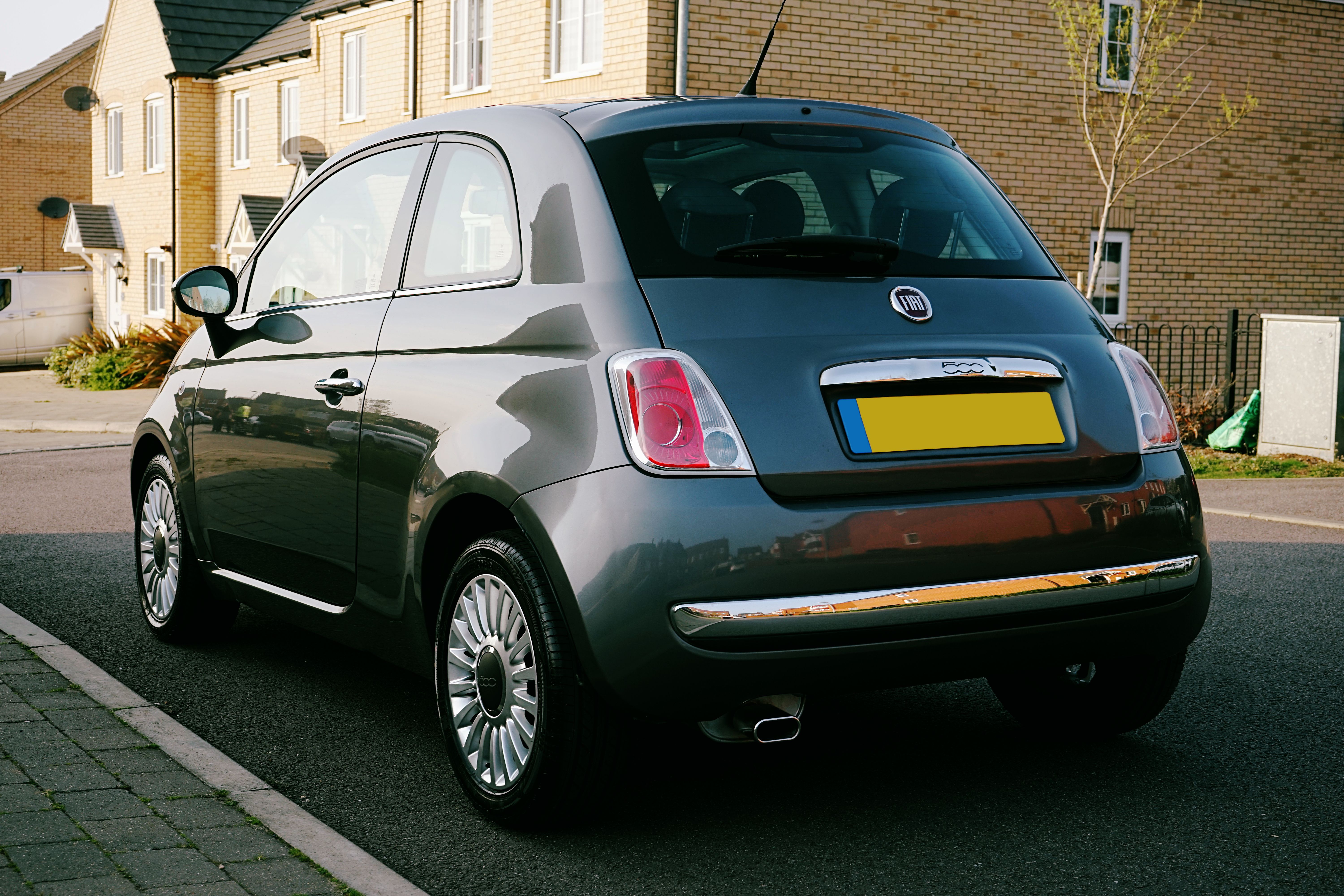 Brown Car Parked on Gray Pavement · Free Stock Photo