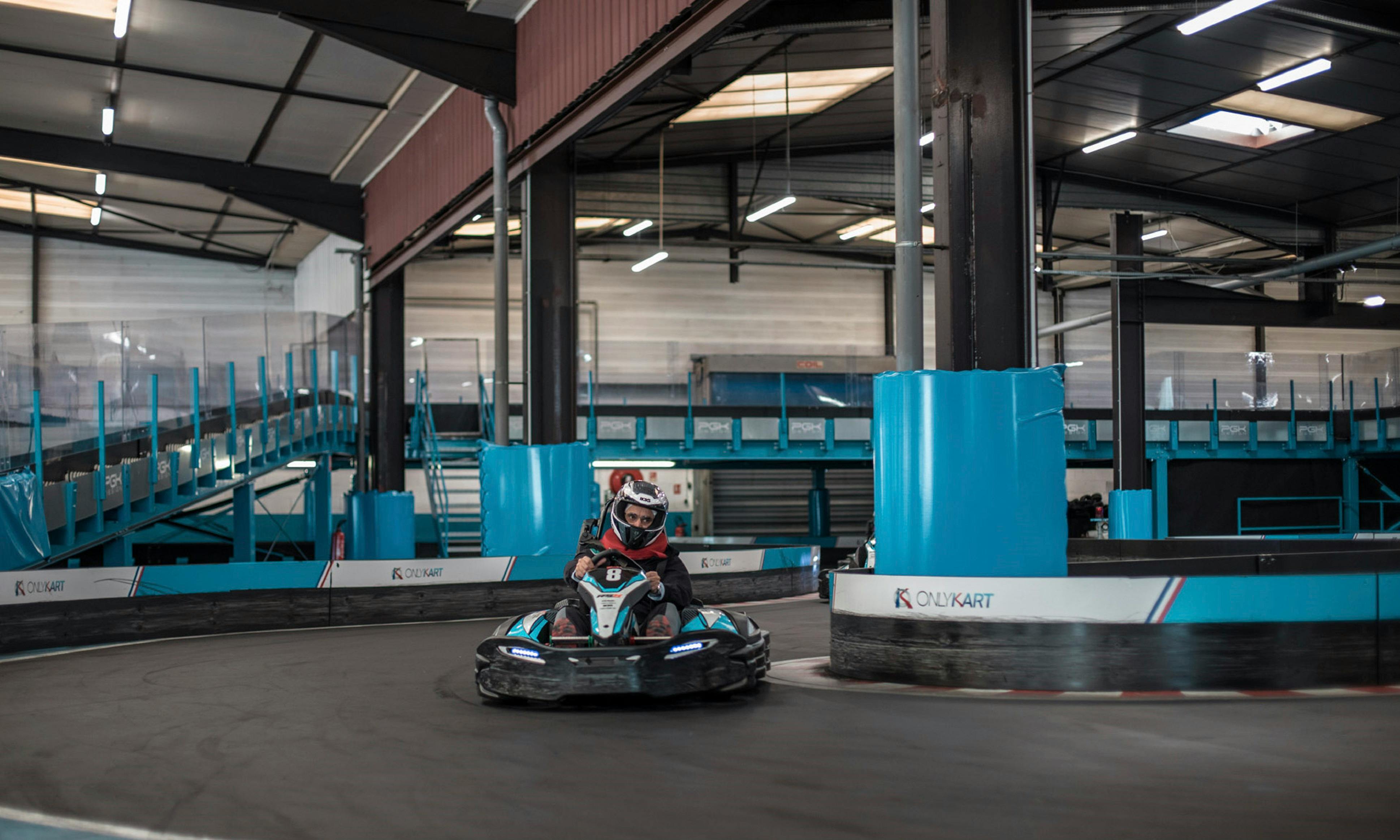 Three Men Riding on Go Karts · Free Stock Photo