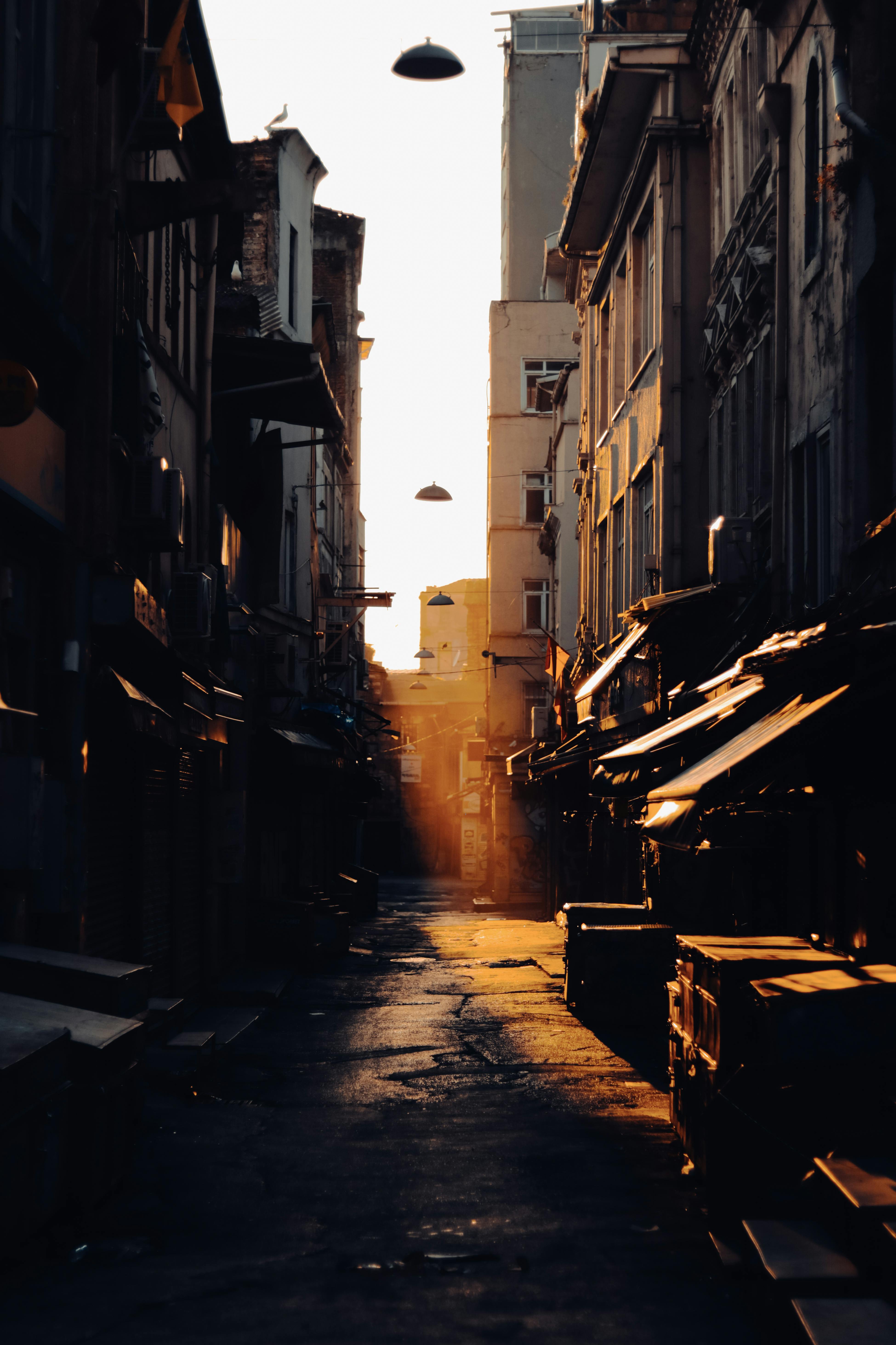 Alley Between Two Brick Building · Free Stock Photo
