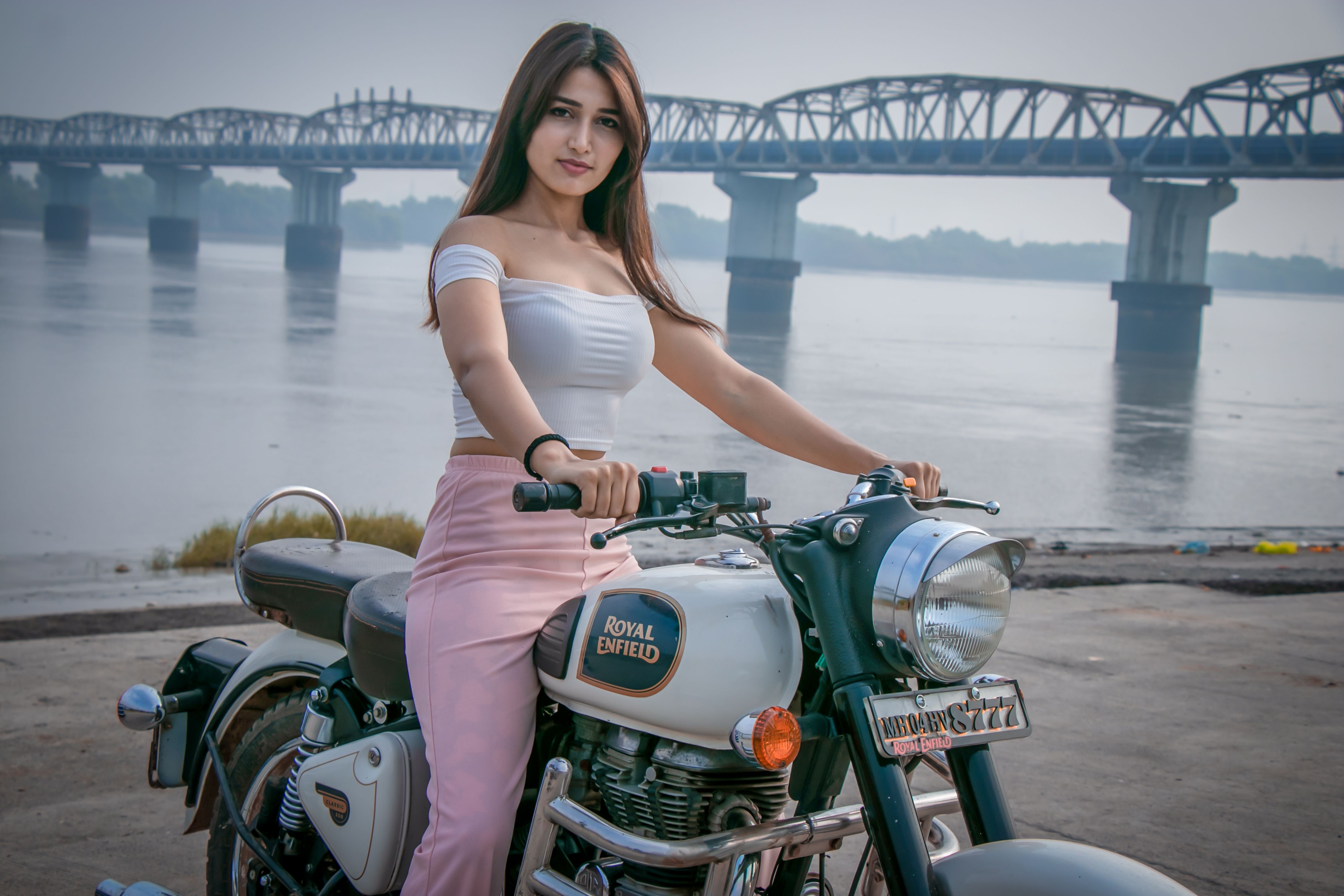 Photo of a Girl in a Dress Riding a Motorcycle · Free Stock Photo