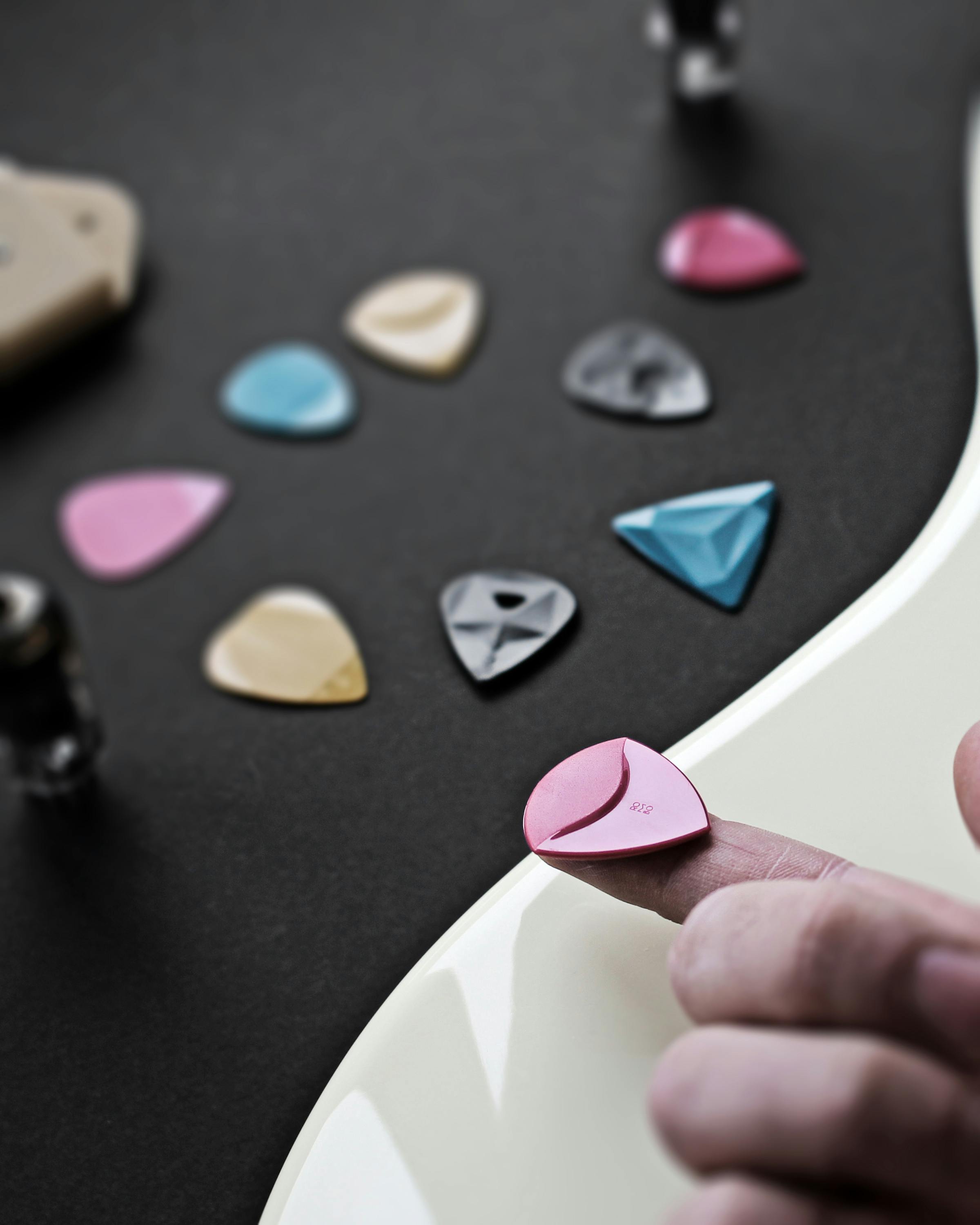 Shallow Focus Photo of Pink Guitar Pick · Free Stock Photo