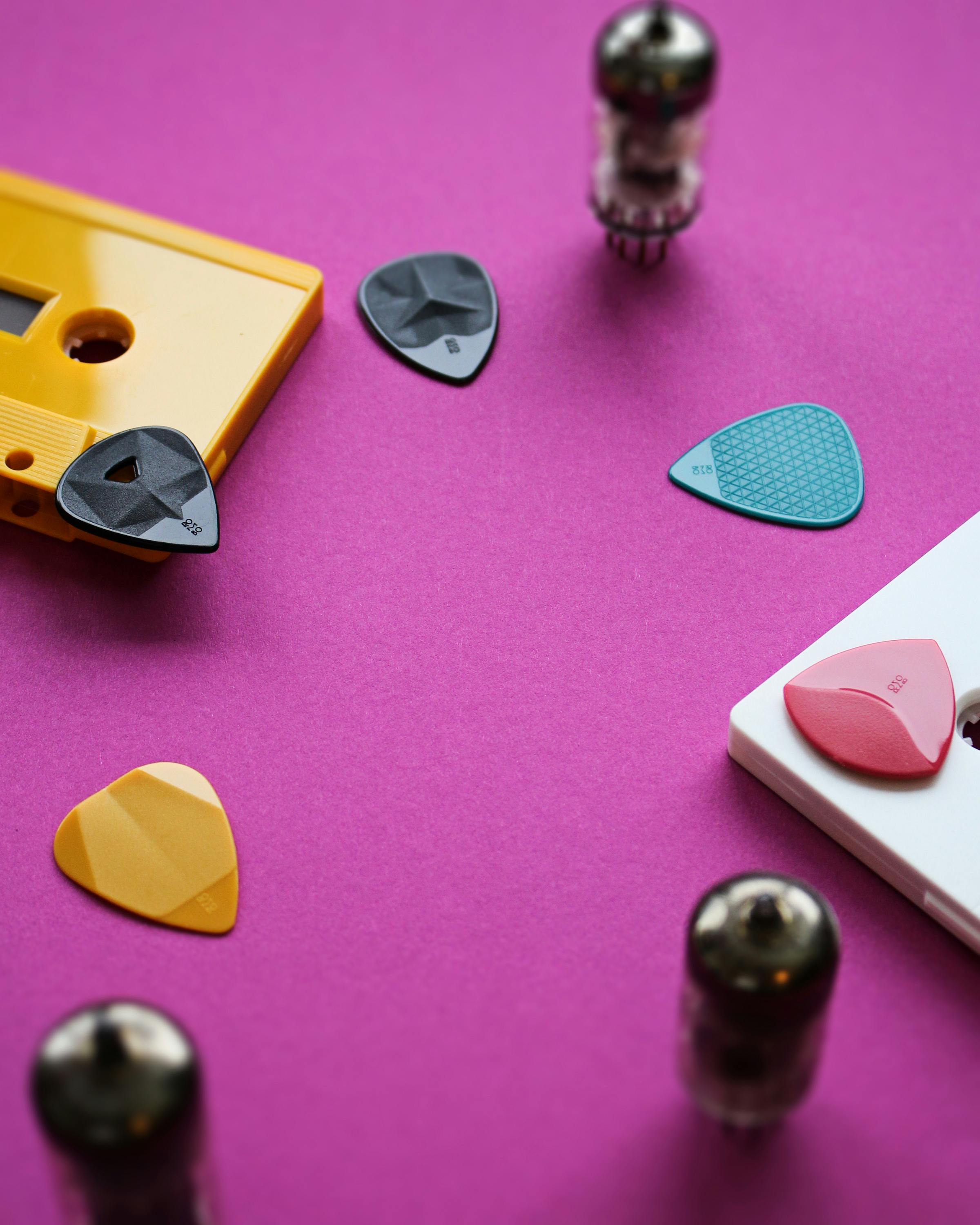 Shallow Focus Photo of Pink Guitar Pick · Free Stock Photo