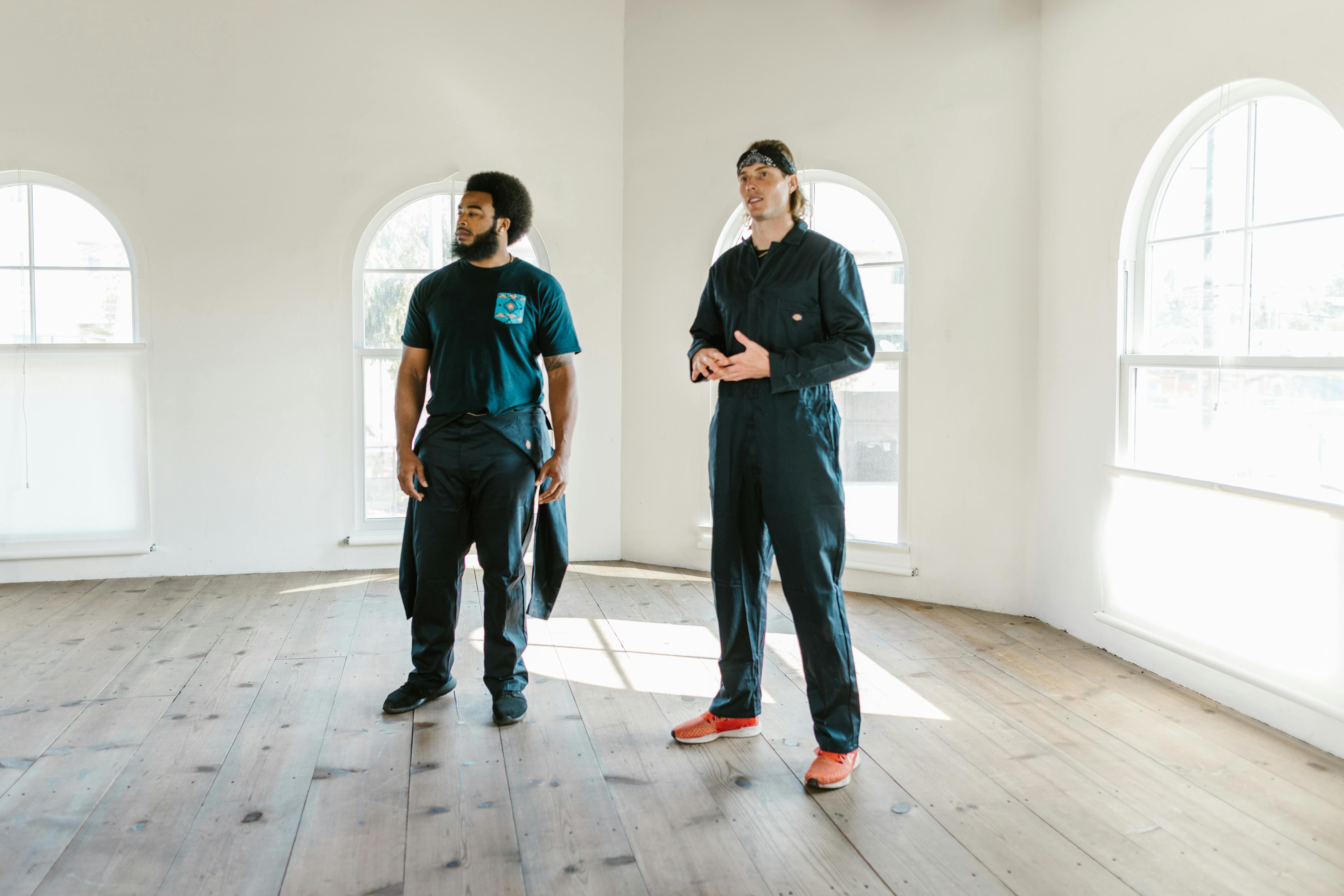 Two Men Walking Together · Free Stock Photo