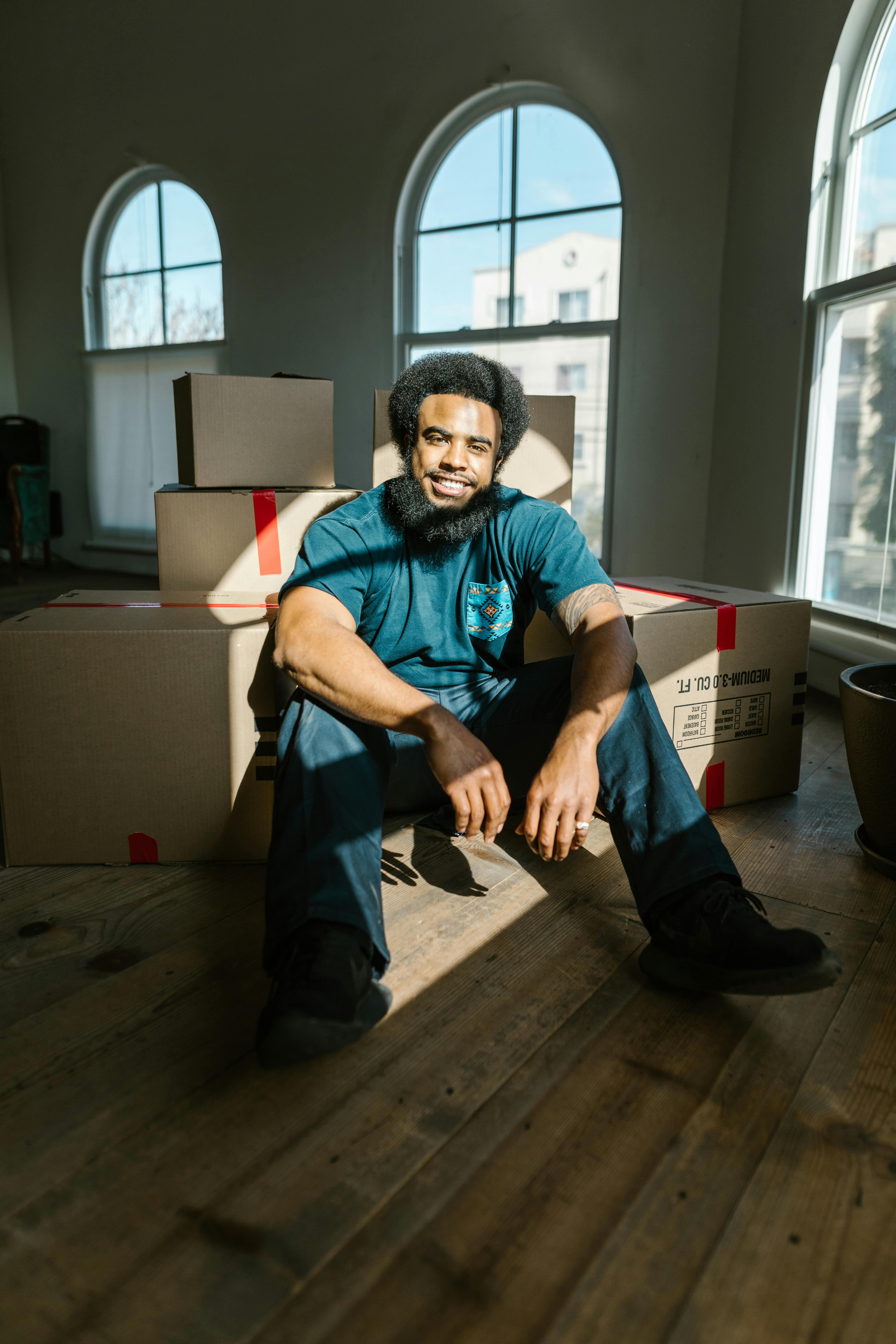 Person Sitting Inside the Cardboard Box · Free Stock Photo