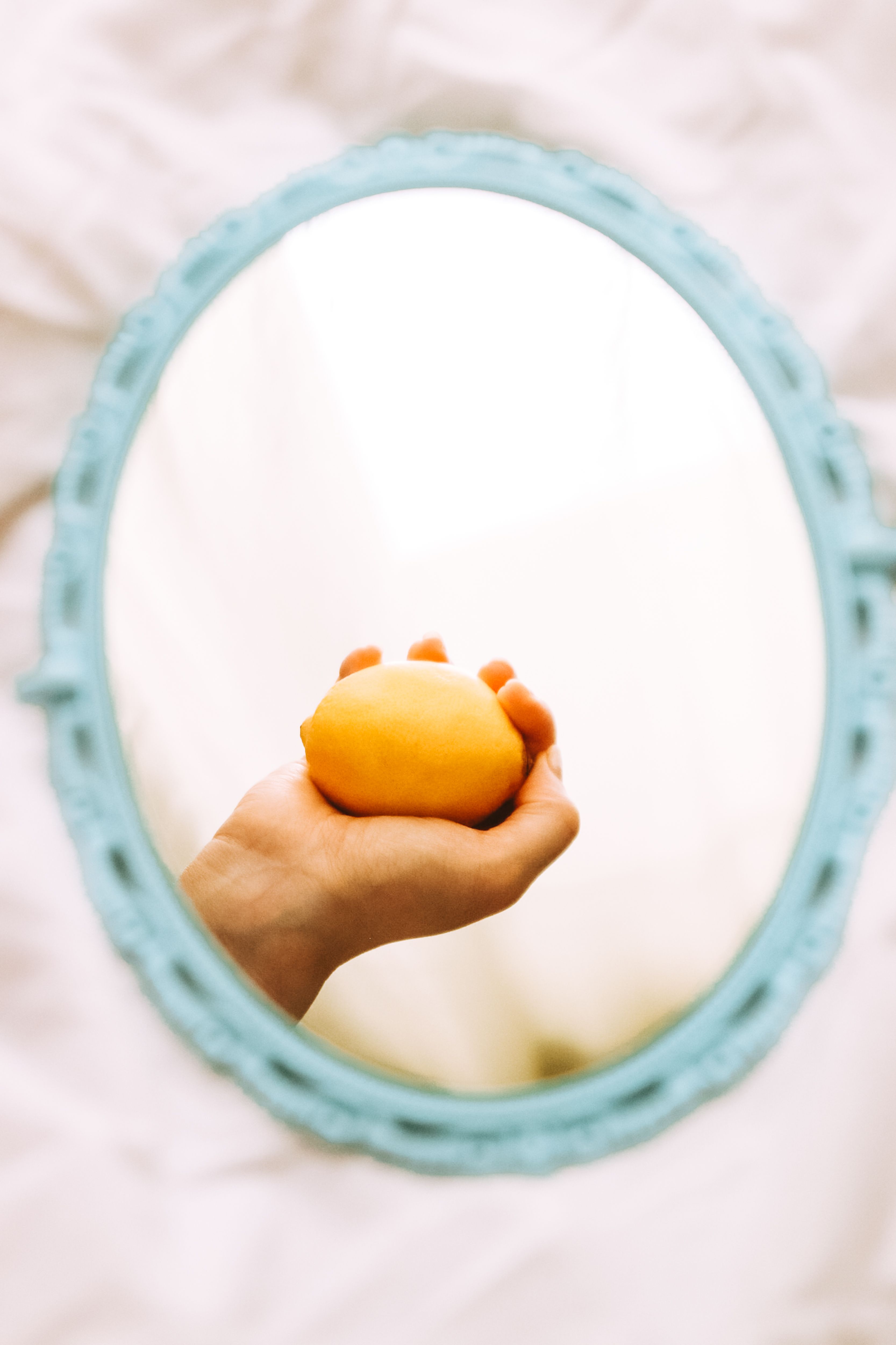 A Person Holding a Mirror · Free Stock Photo