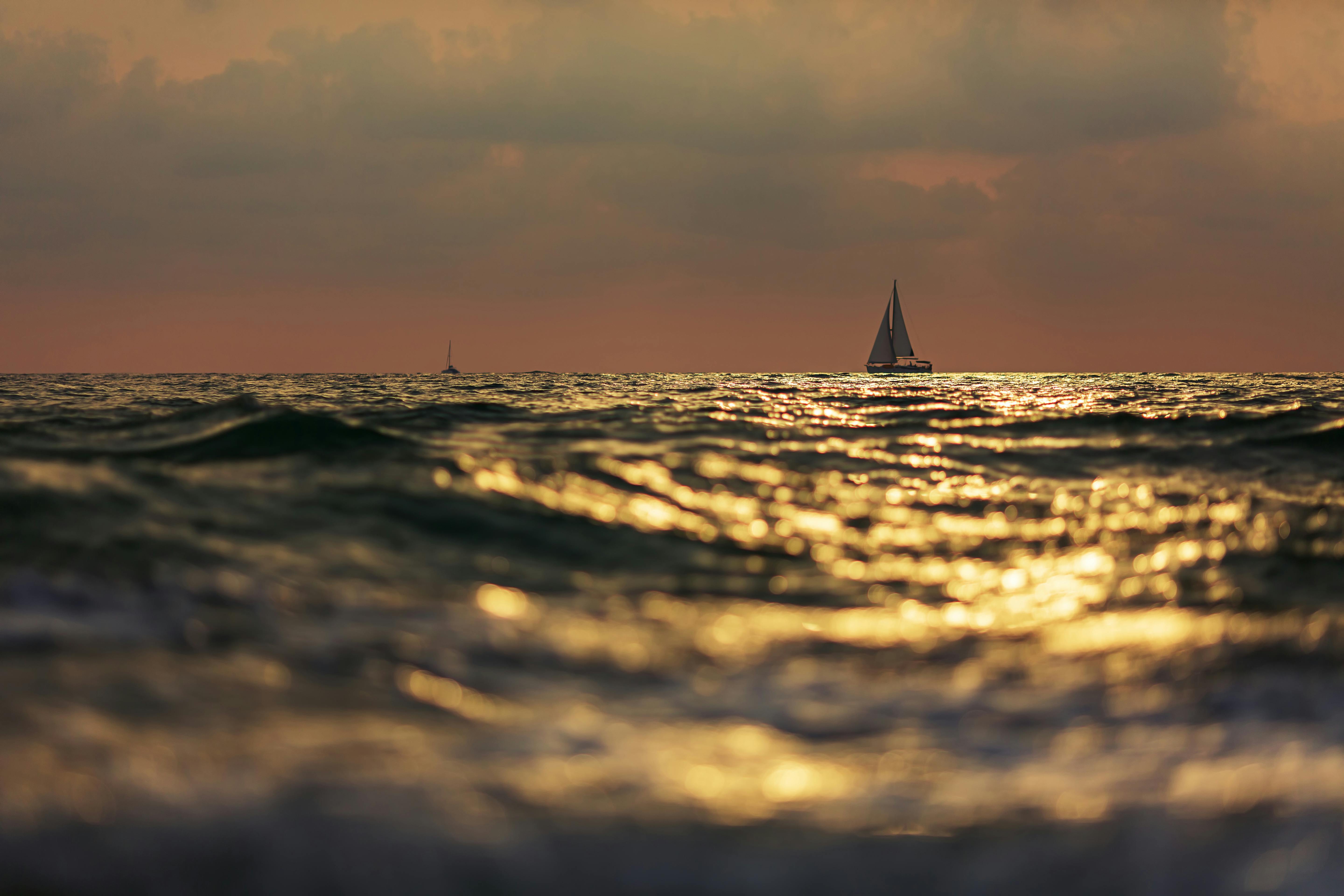 Low-Angle Shot of Sailboat on the Ocean · Free Stock Photo