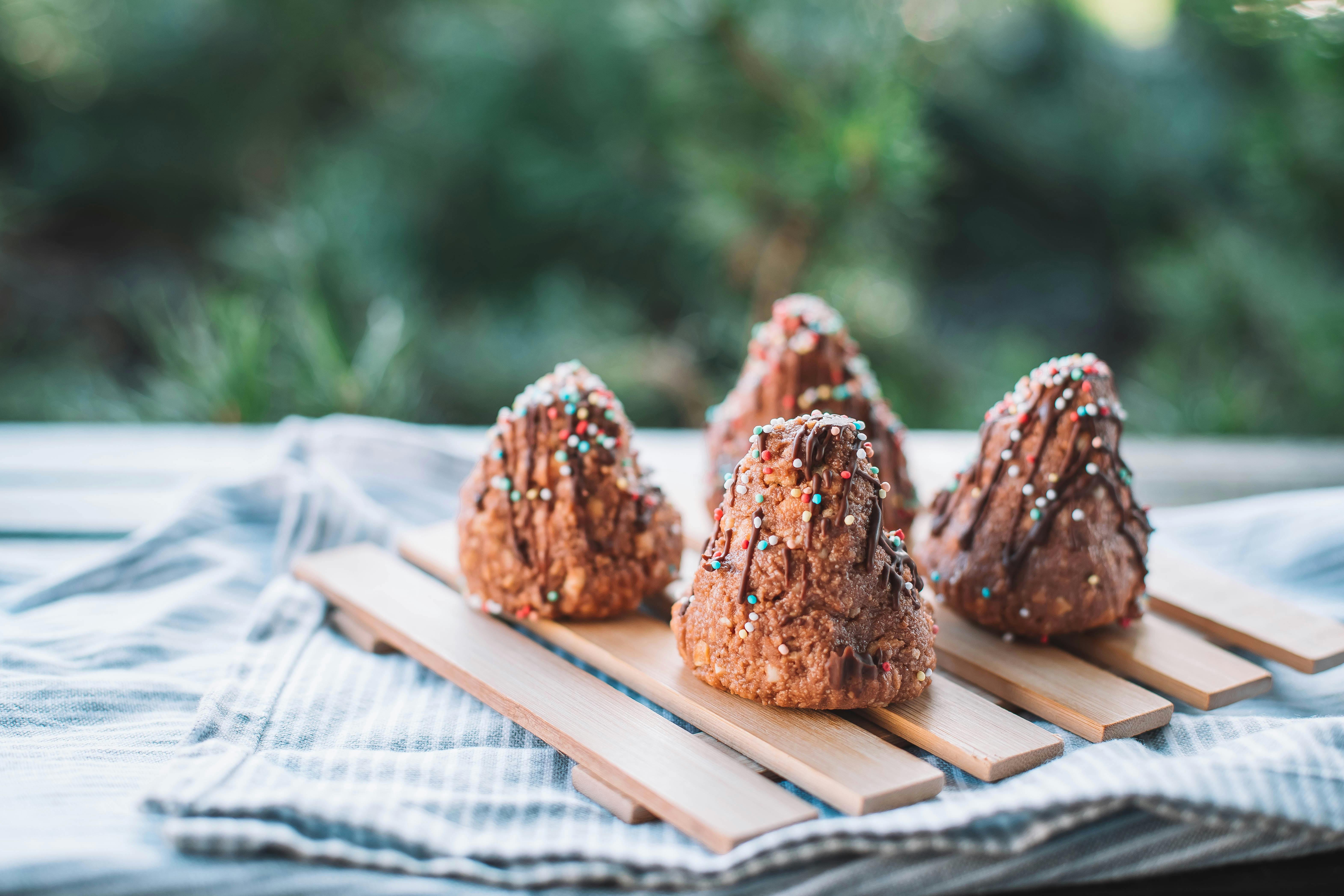 Chocolate Coated Dessert on a Wooden Plank · Free Stock Photo