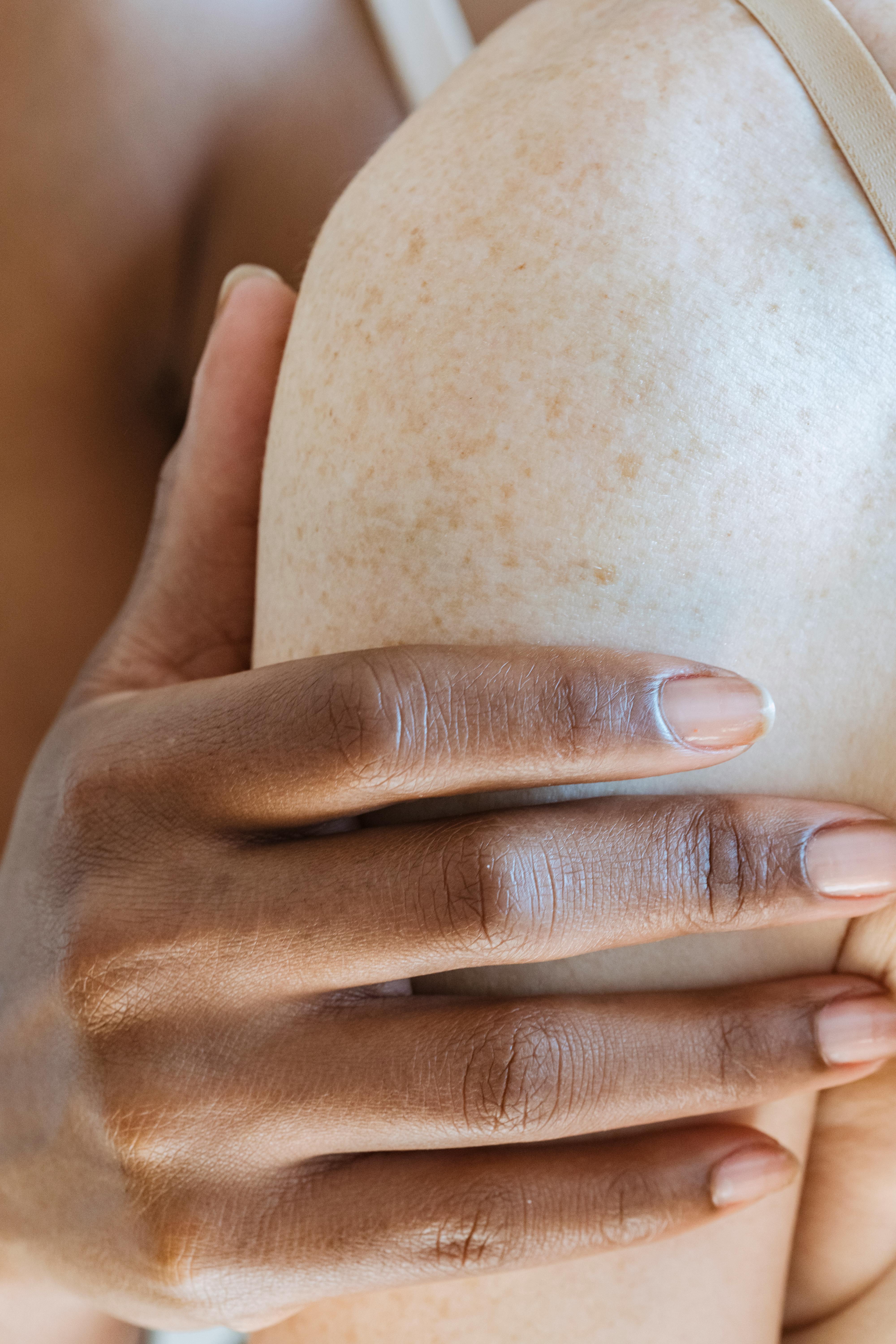 Person Touching Another Person's Arm · Free Stock Photo